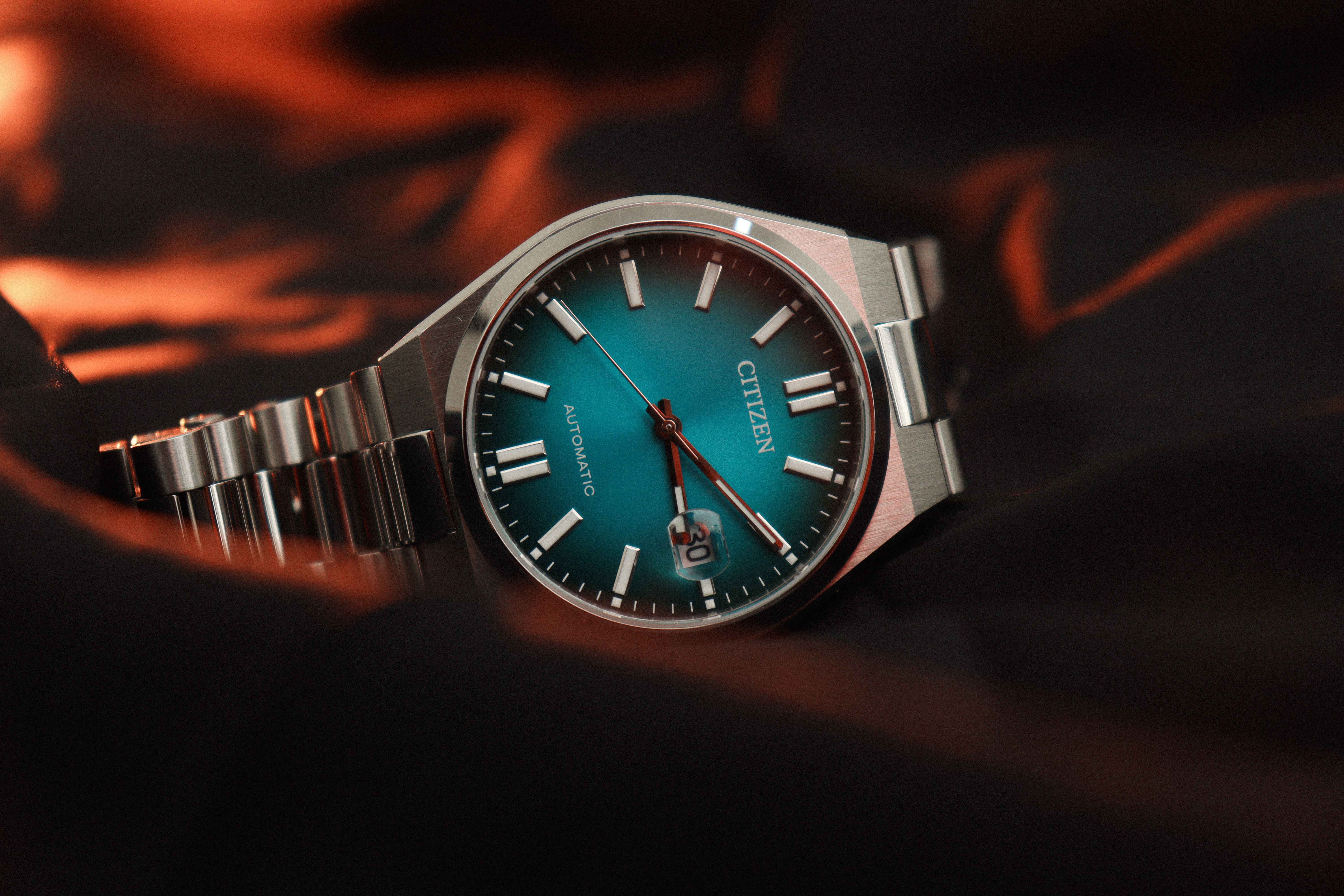 Elegant Wrist Watch with Teal Dial in Studio Lighting · Free Stock Photo