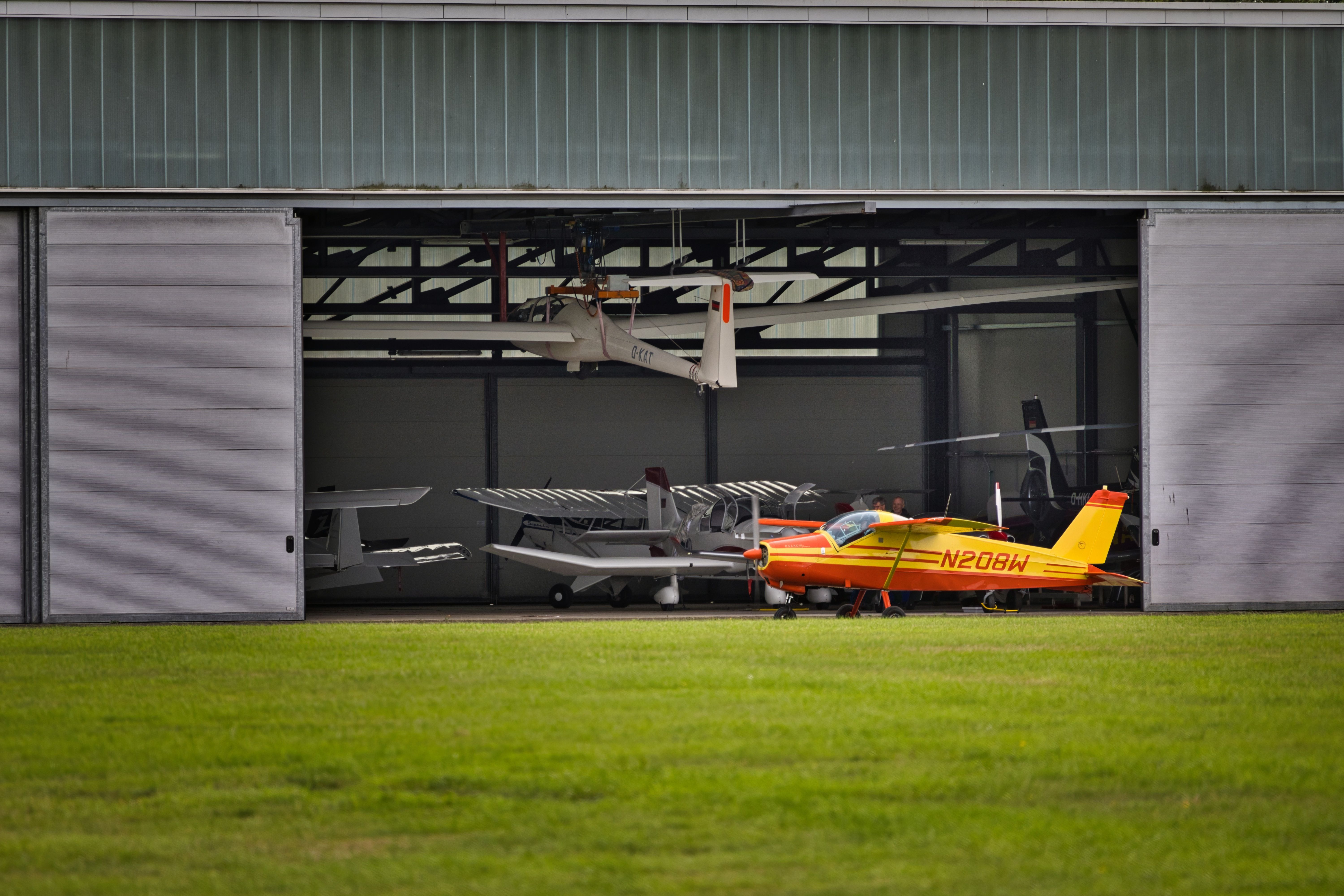 Private Plane Hangar with Multiple Aircrafts · Free Stock Photo