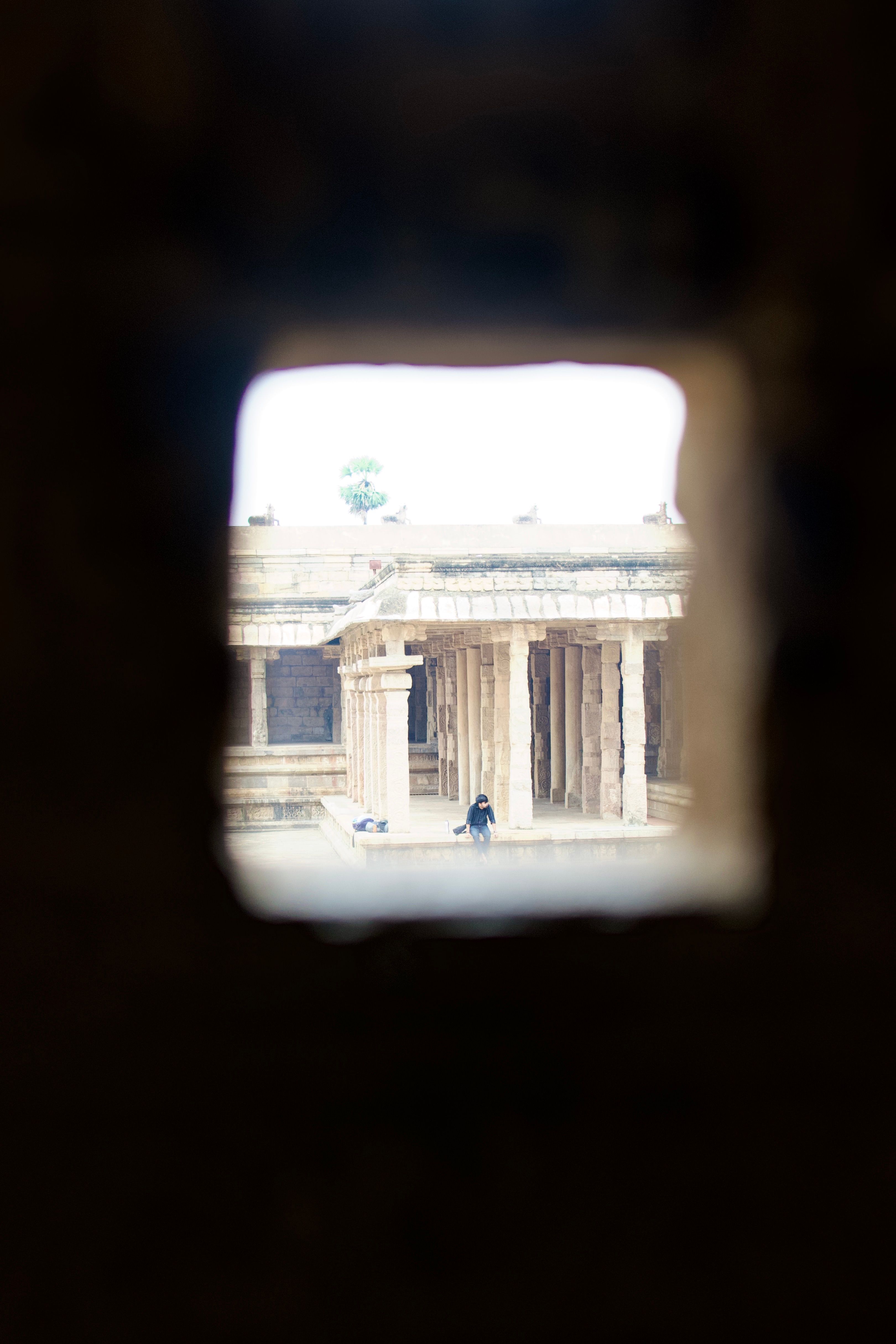 Ancient Temple Viewed Through Narrow Opening · Free Stock Photo
