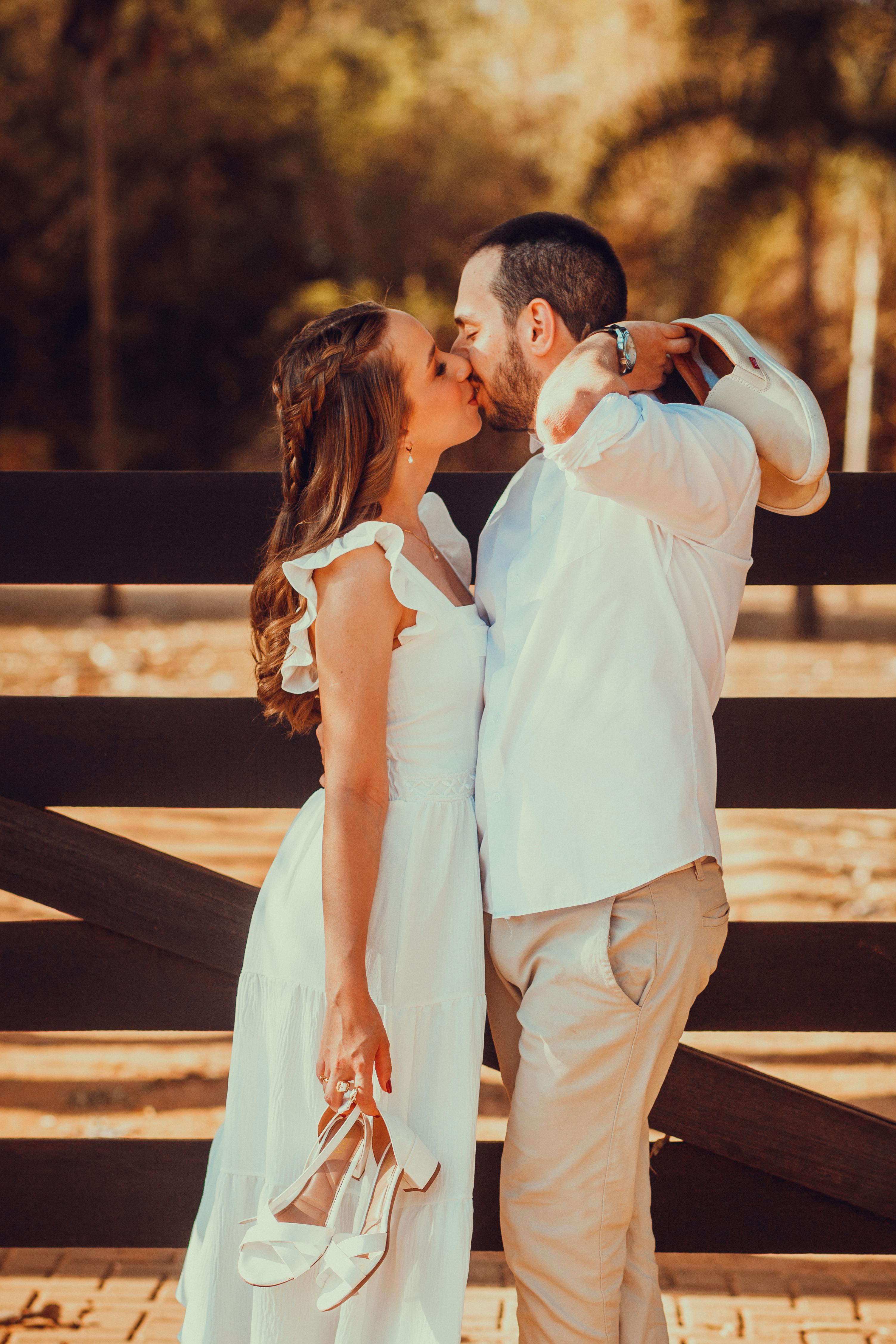 Groom Kissing Bride Neck · Free Stock Photo
