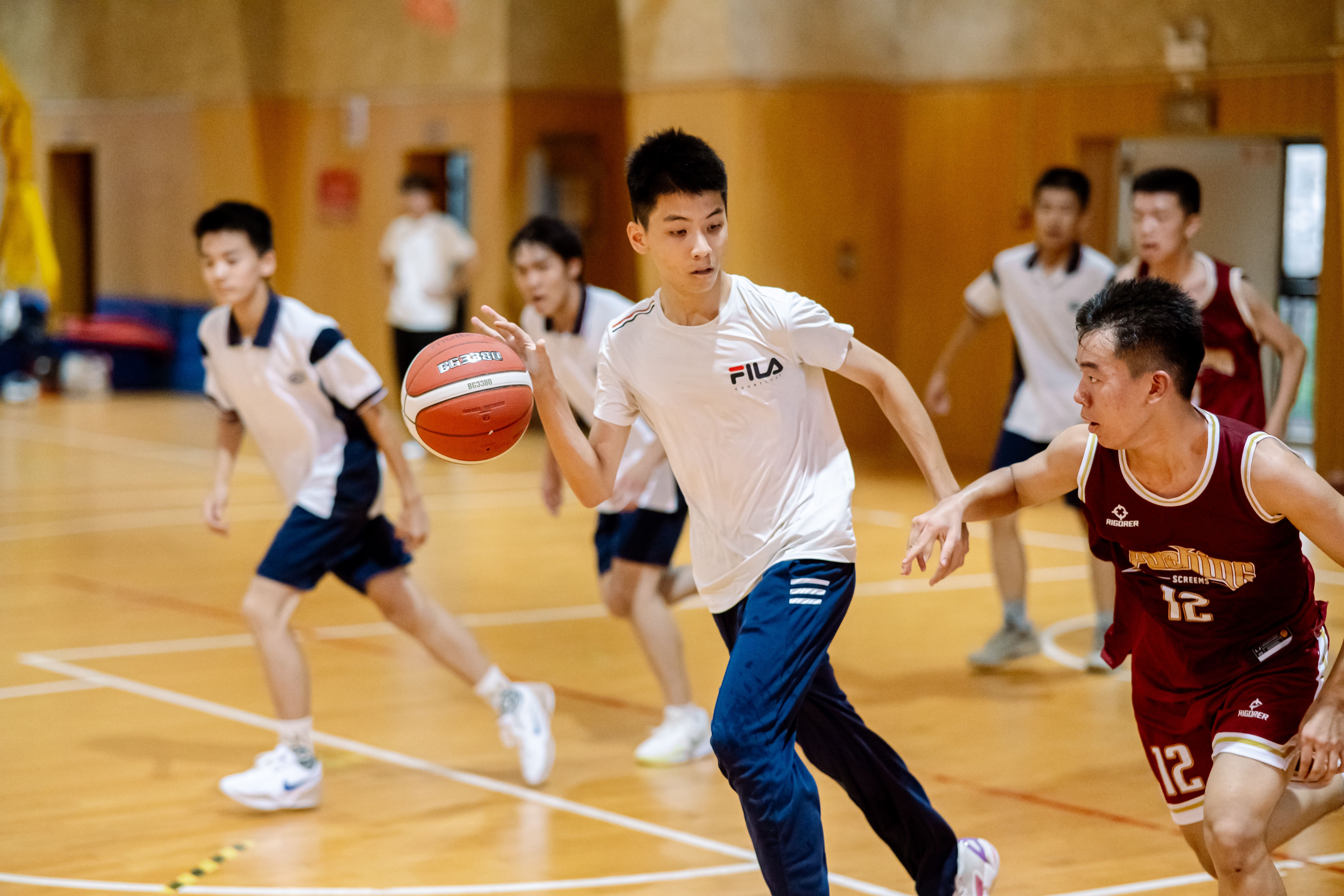 Youth Basketball Game in Indoor Sports Hall · Free Stock Photo