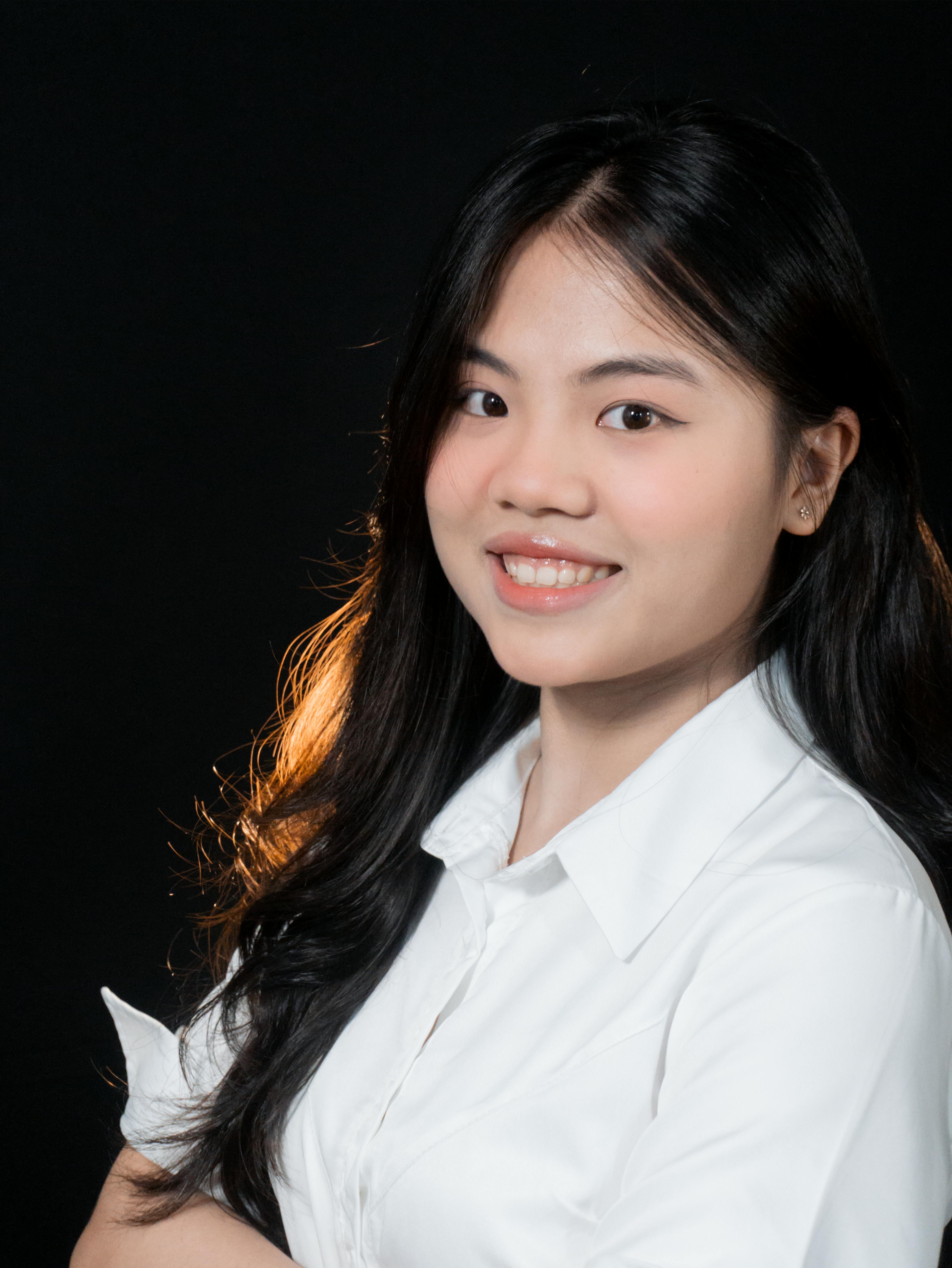 Professional Portrait of Smiling Young Woman · Free Stock Photo