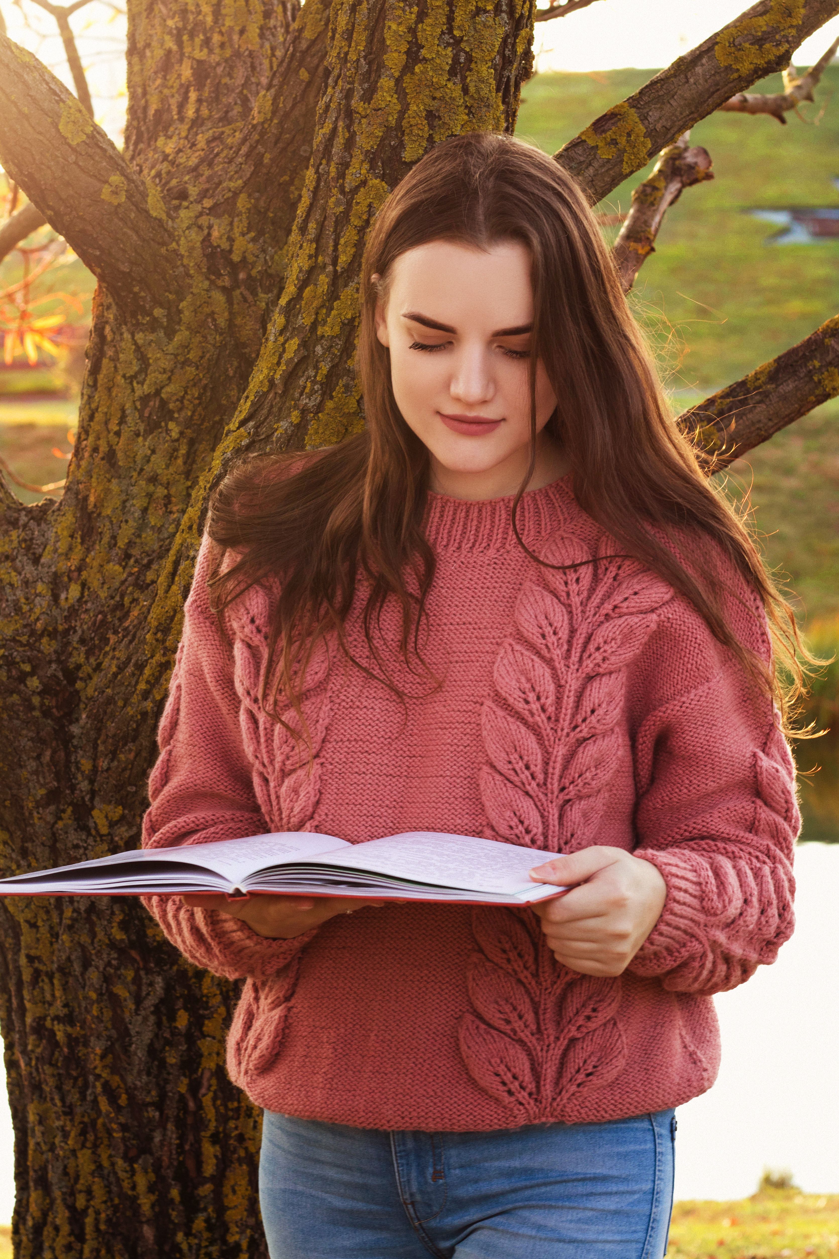 Woman Holding A Book · Free Stock Photo