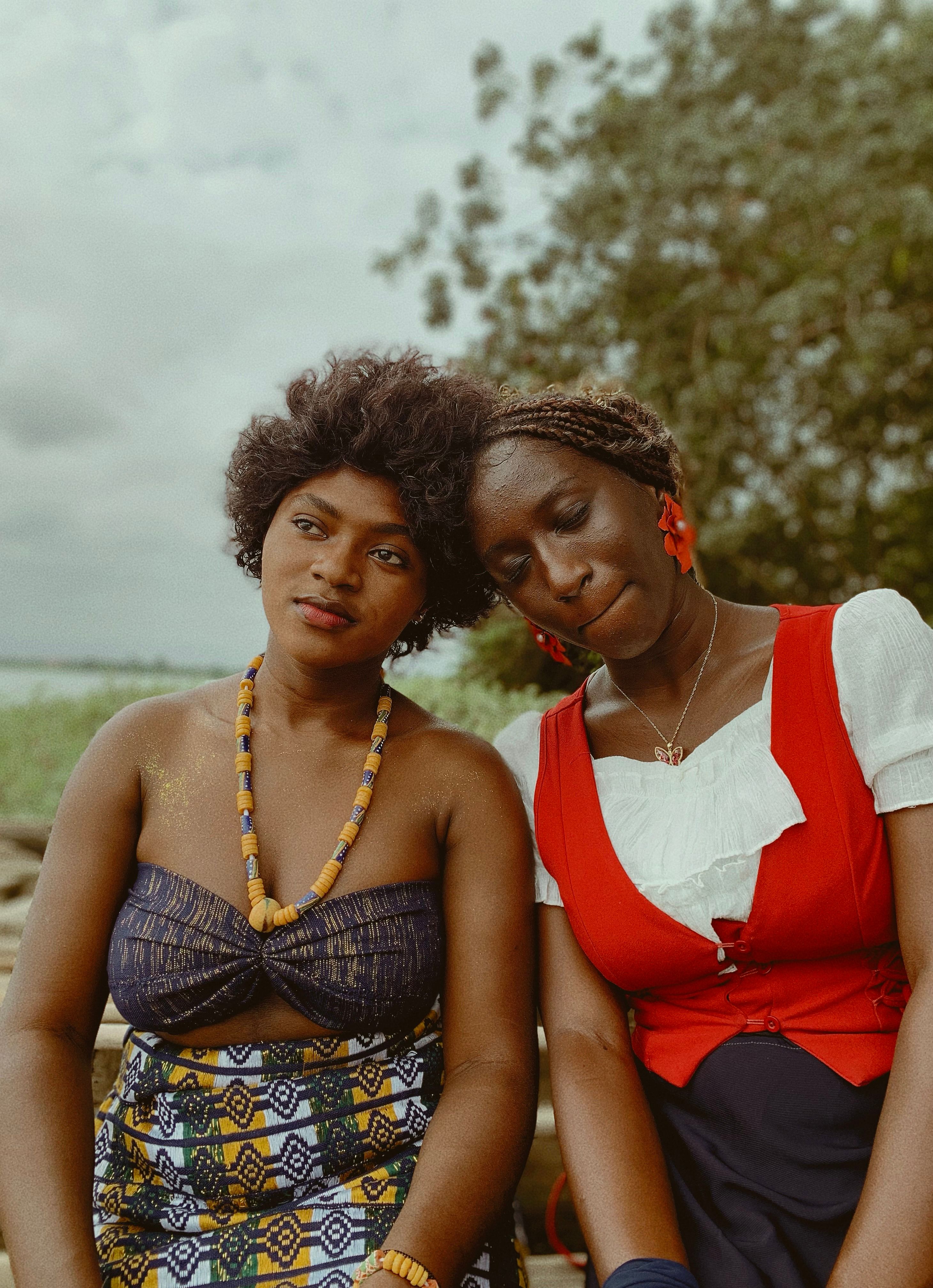 Ghanaian Women in Traditional Fashion Outdoors · Free Stock Photo
