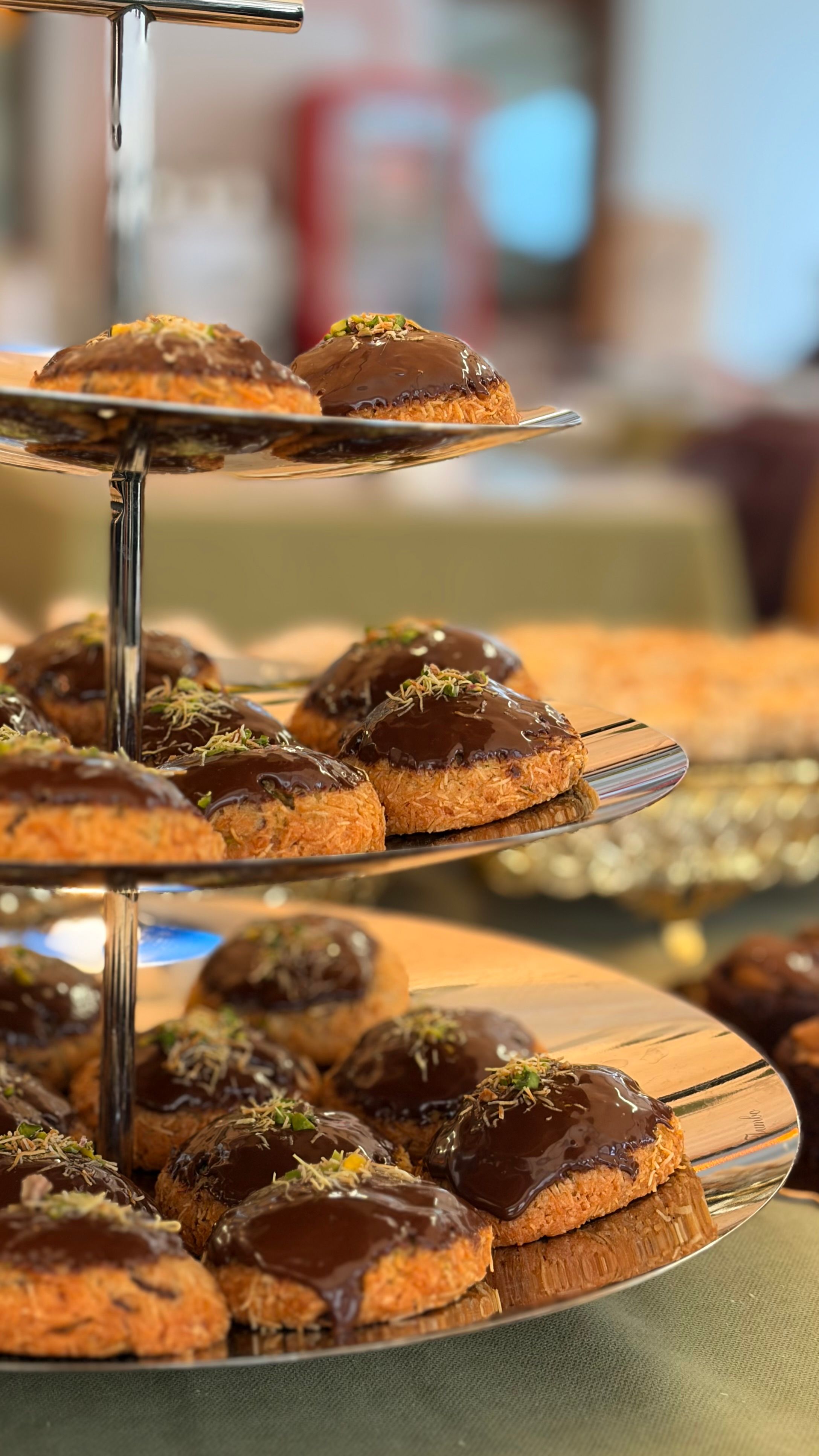 Chocolate-Dipped Pastries on Display Stand · Free Stock Photo