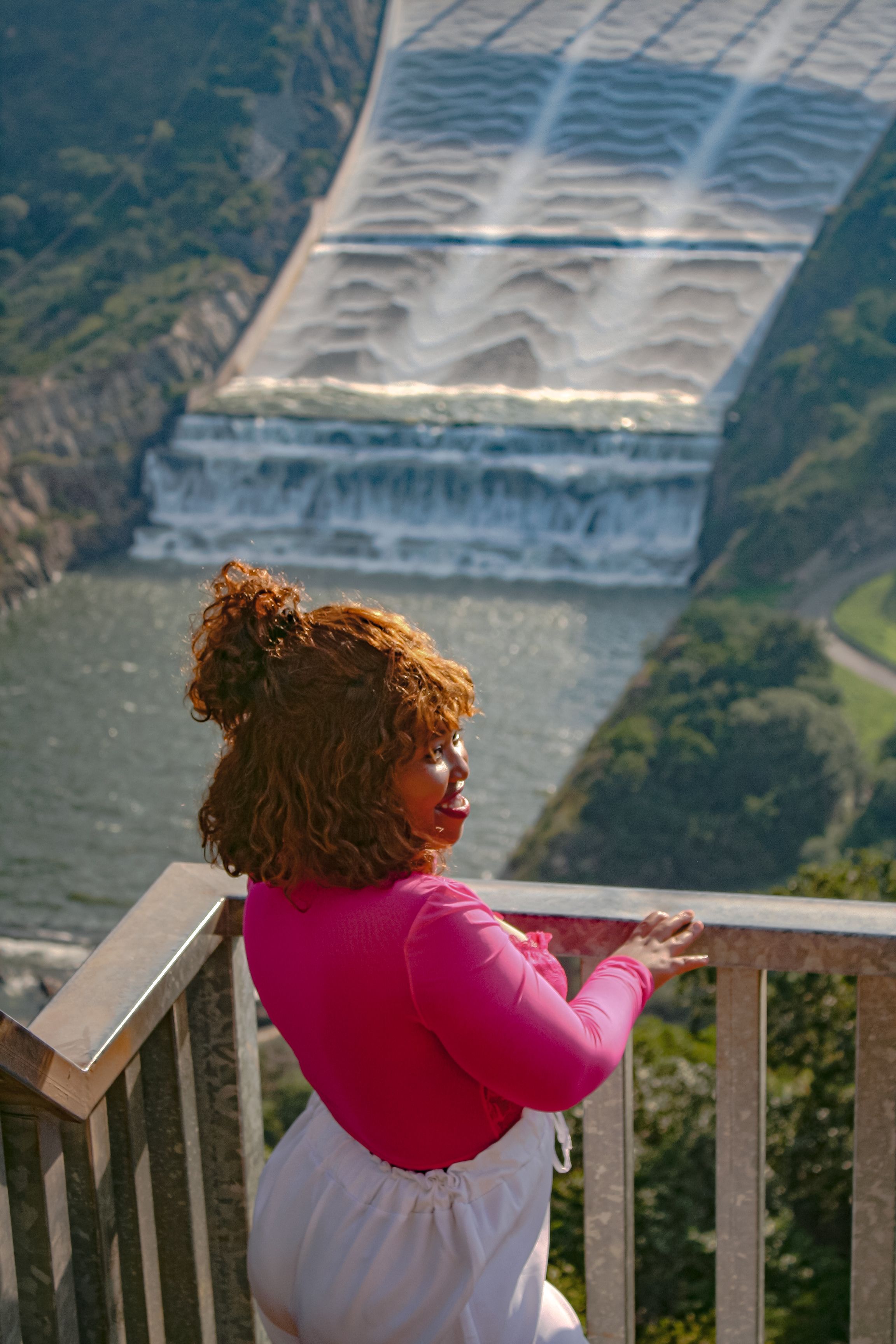 Woman Enjoying Scenic View at Manzini Dam · Free Stock Photo