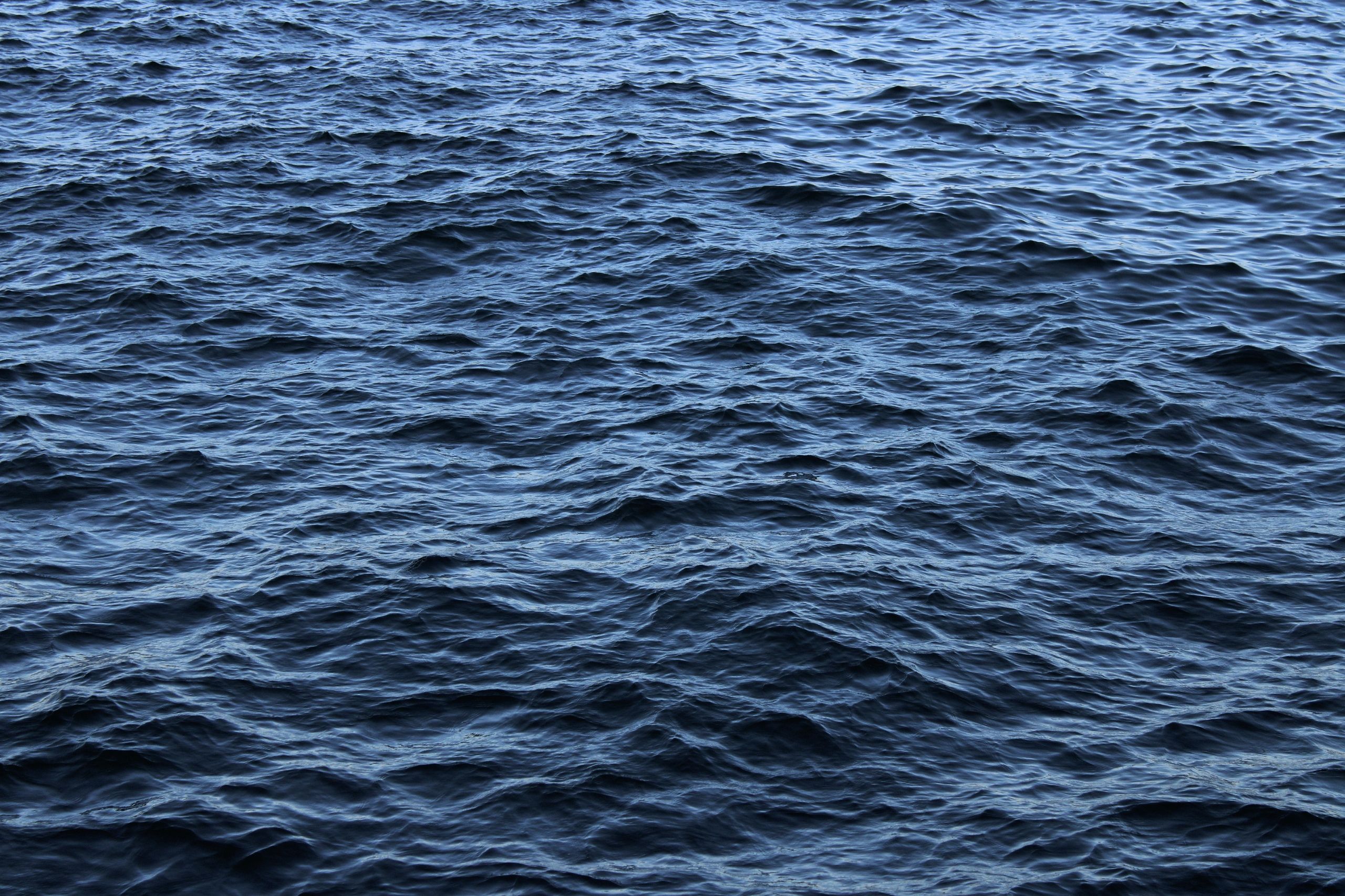 Close-up view of blue ocean waves texture · Free Stock Photo