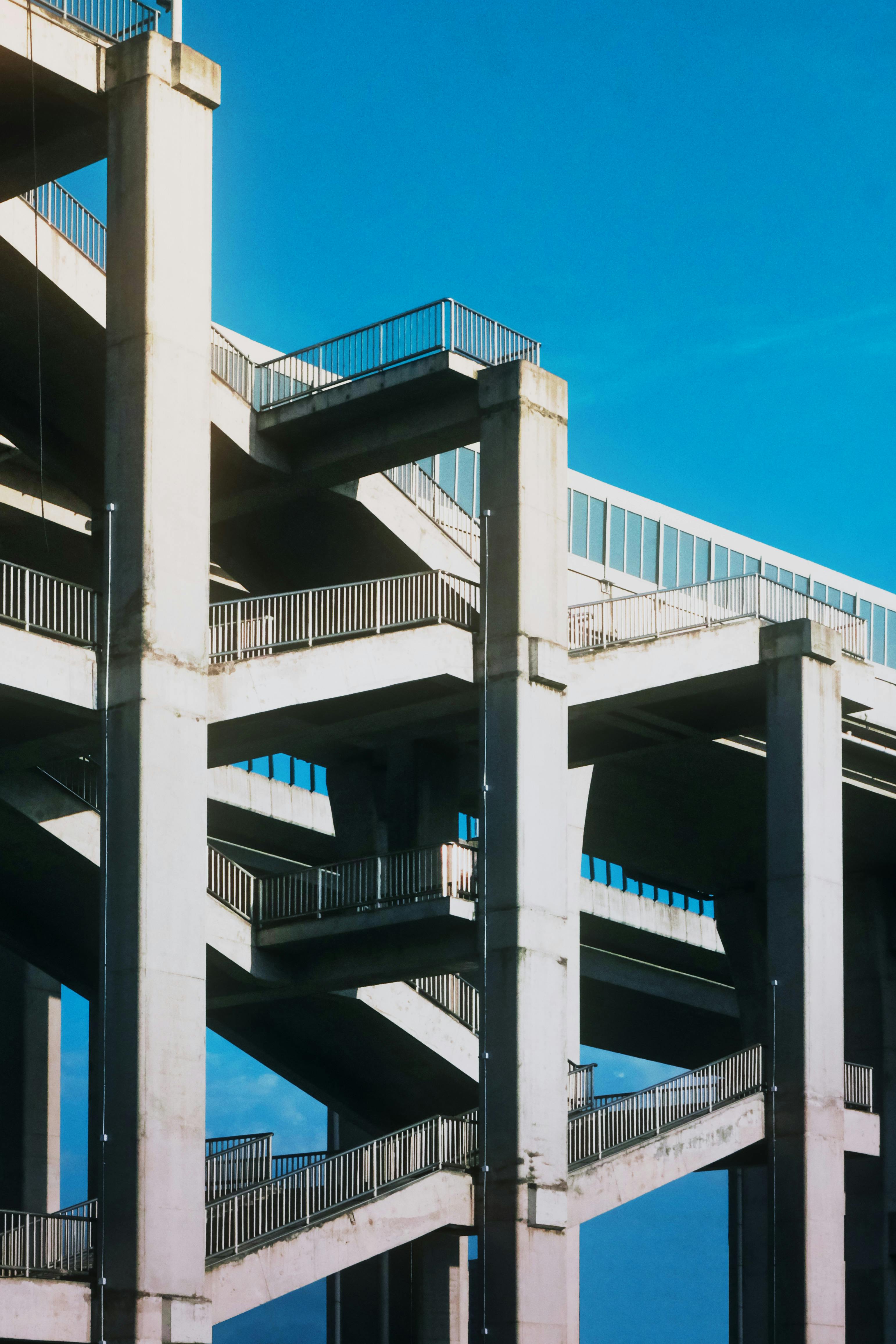 Modern Architectural Concrete Structure with Clear Sky · Free Stock Photo