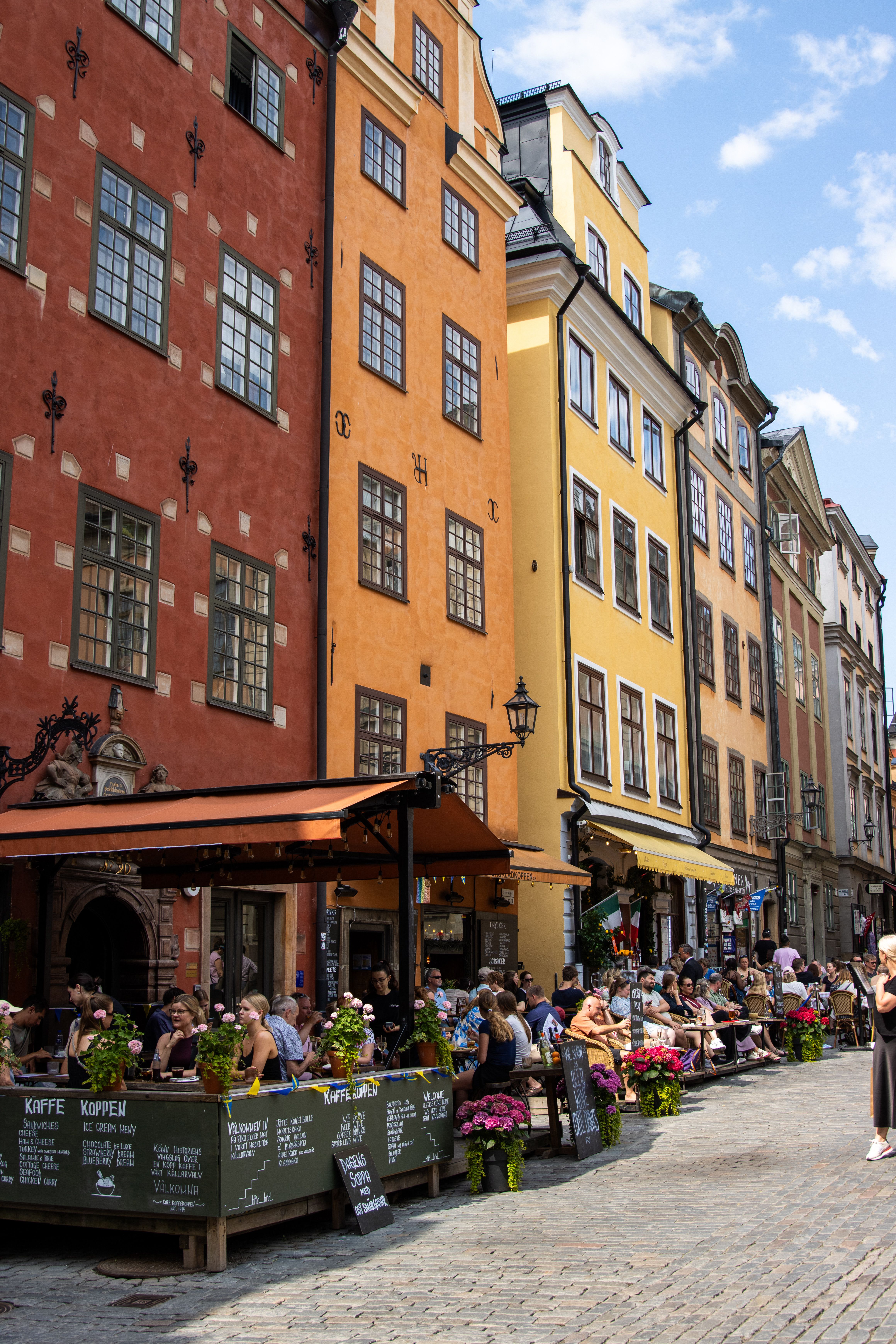 Vibrant Cafés in Stockholm's Historic Old Town · Free Stock Photo