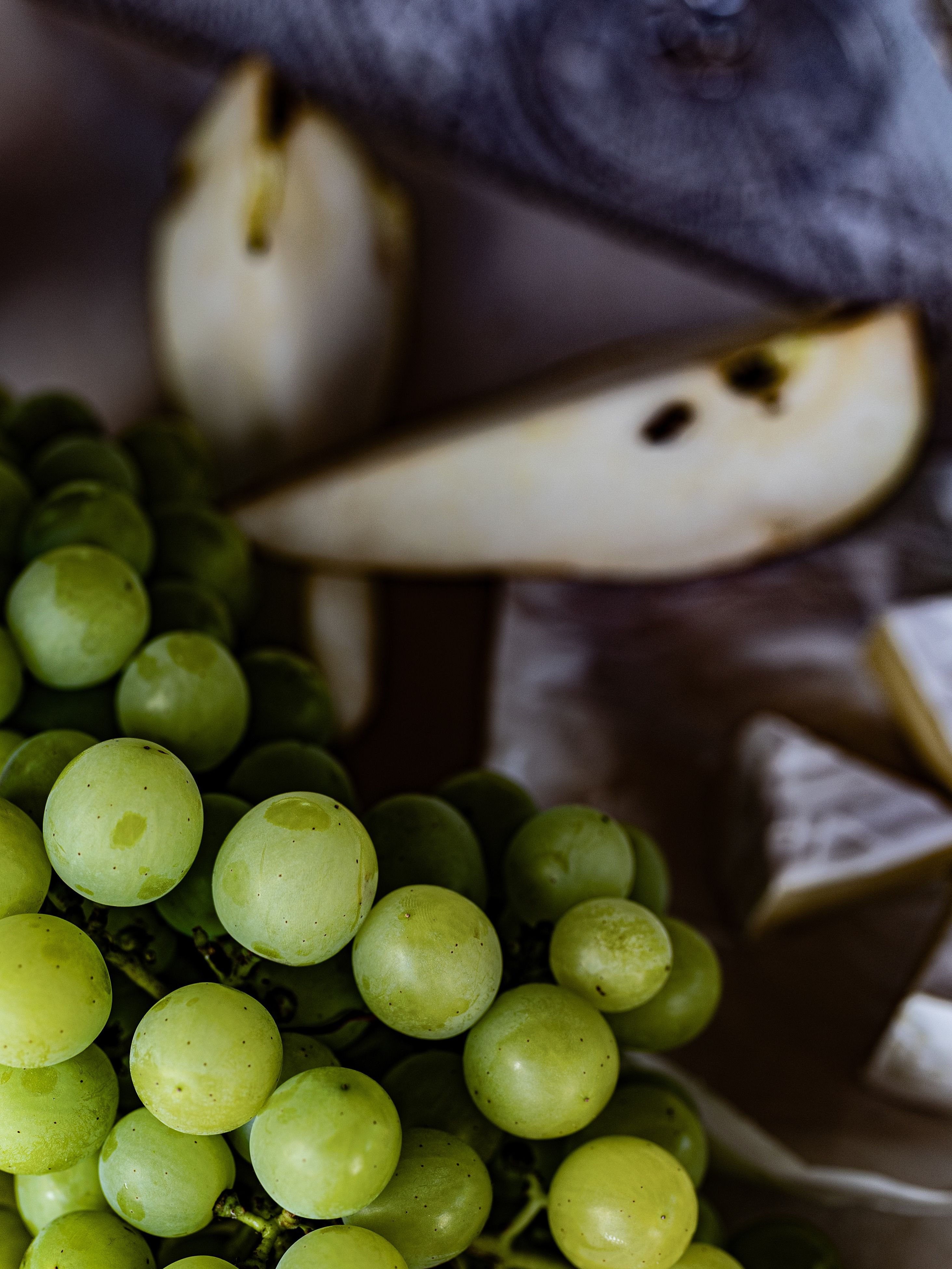 Close-up of Green Grapes and Sliced Pear with Cheese · Free Stock Photo