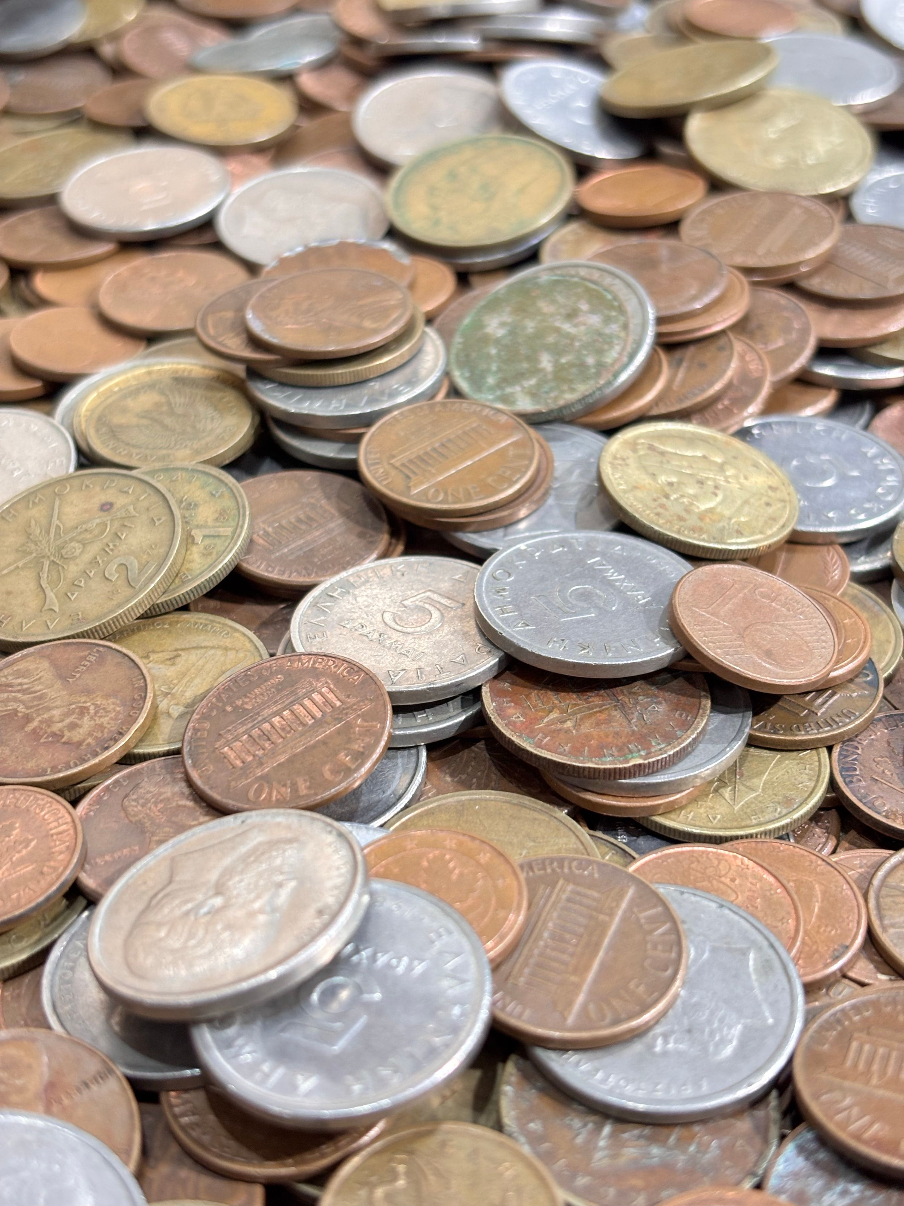 Close-up of Assorted Foreign Currency Coins · Free Stock Photo