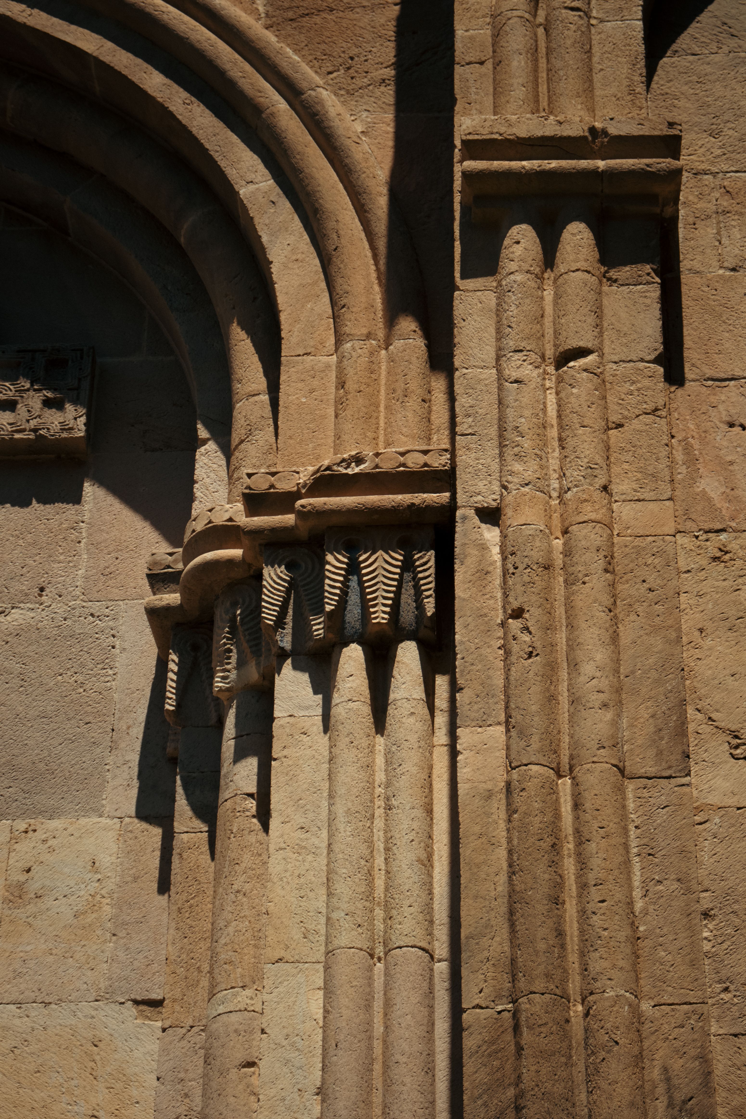 Detail of Romanesque Architectural Stonework · Free Stock Photo