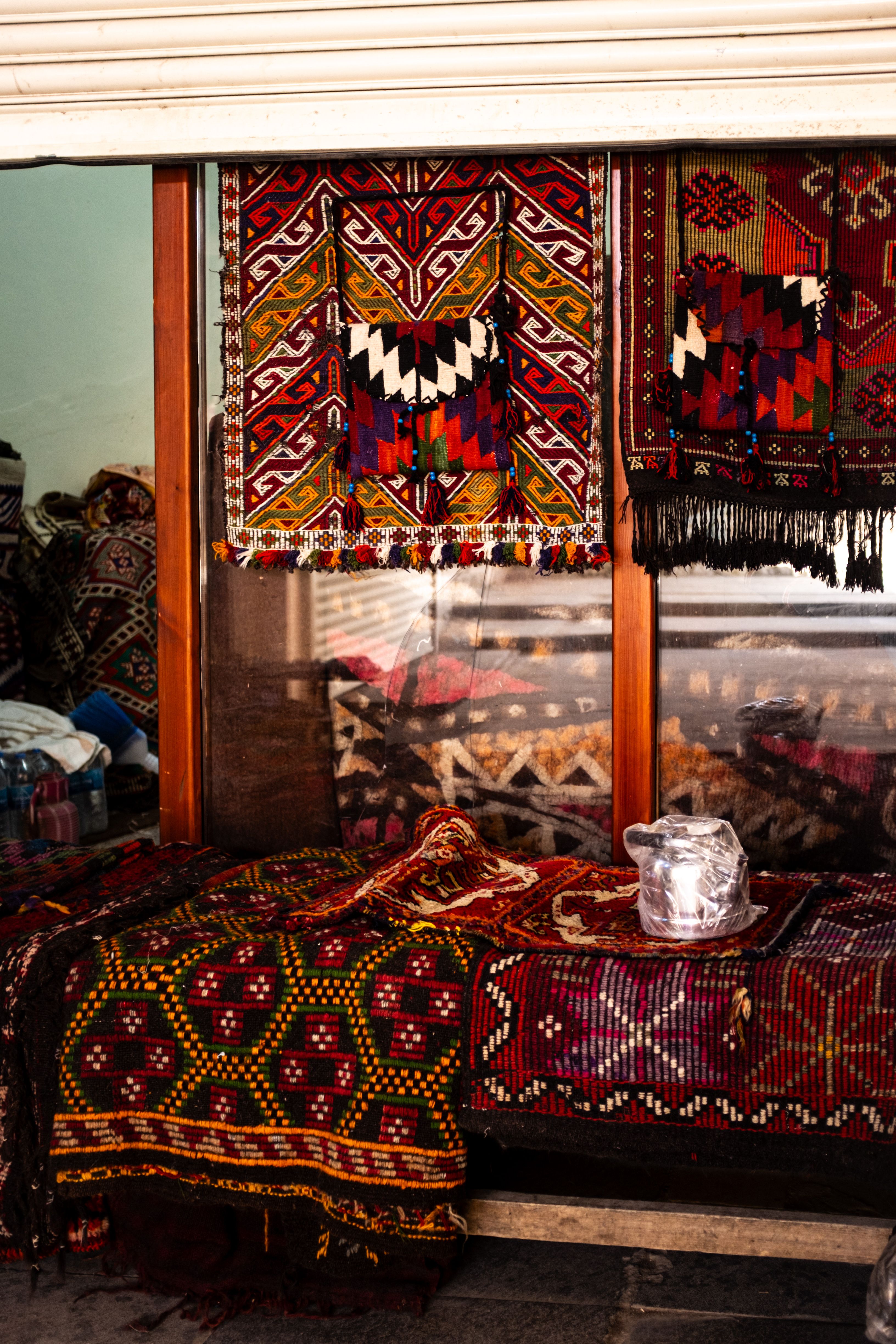 Colorful Traditional Carpets Displayed Indoors · Free Stock Photo