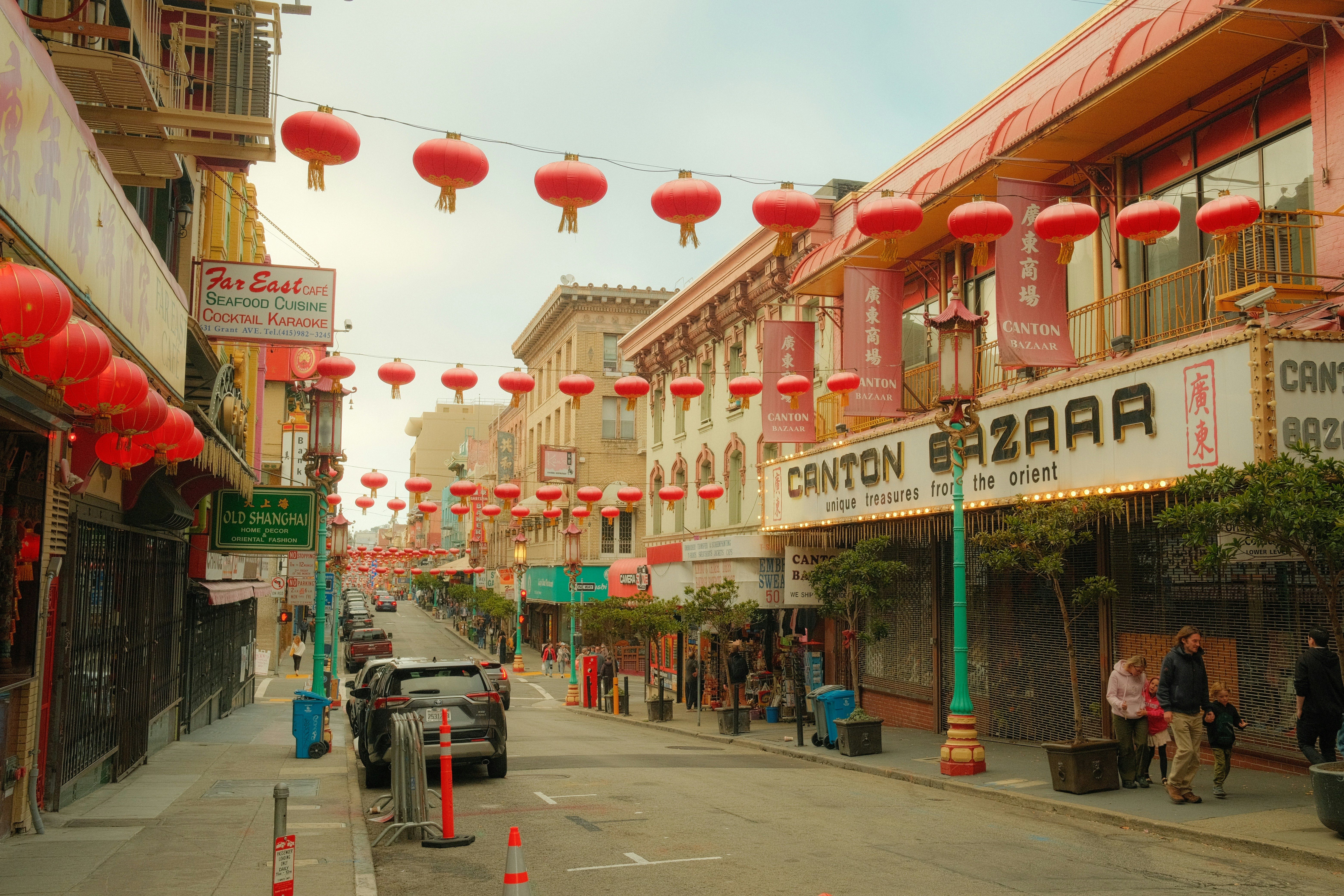 Vibrant Chinatown Street with Hanging Lanterns · Free Stock Photo