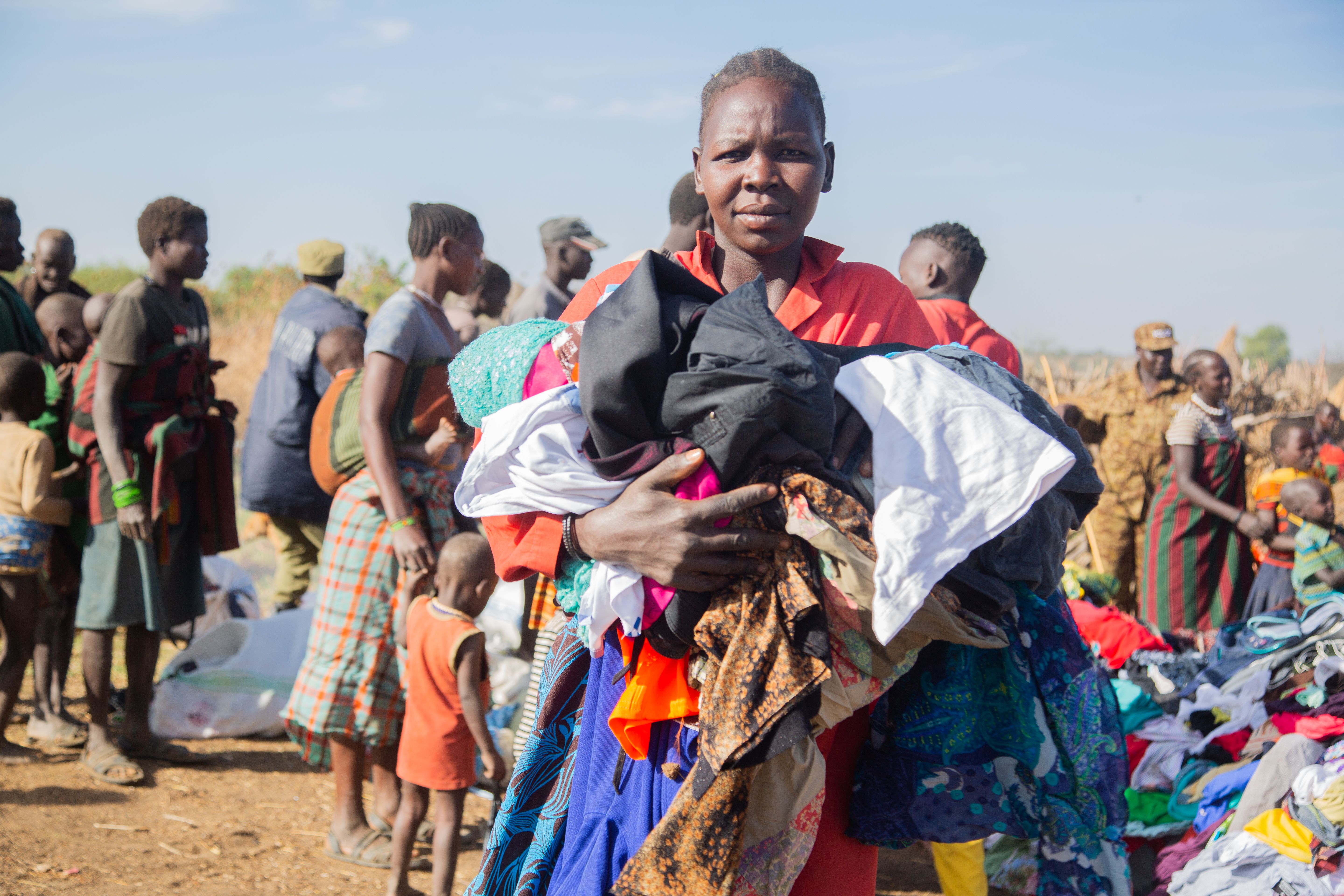 Community Gathering for Clothing Distribution · Free Stock Photo