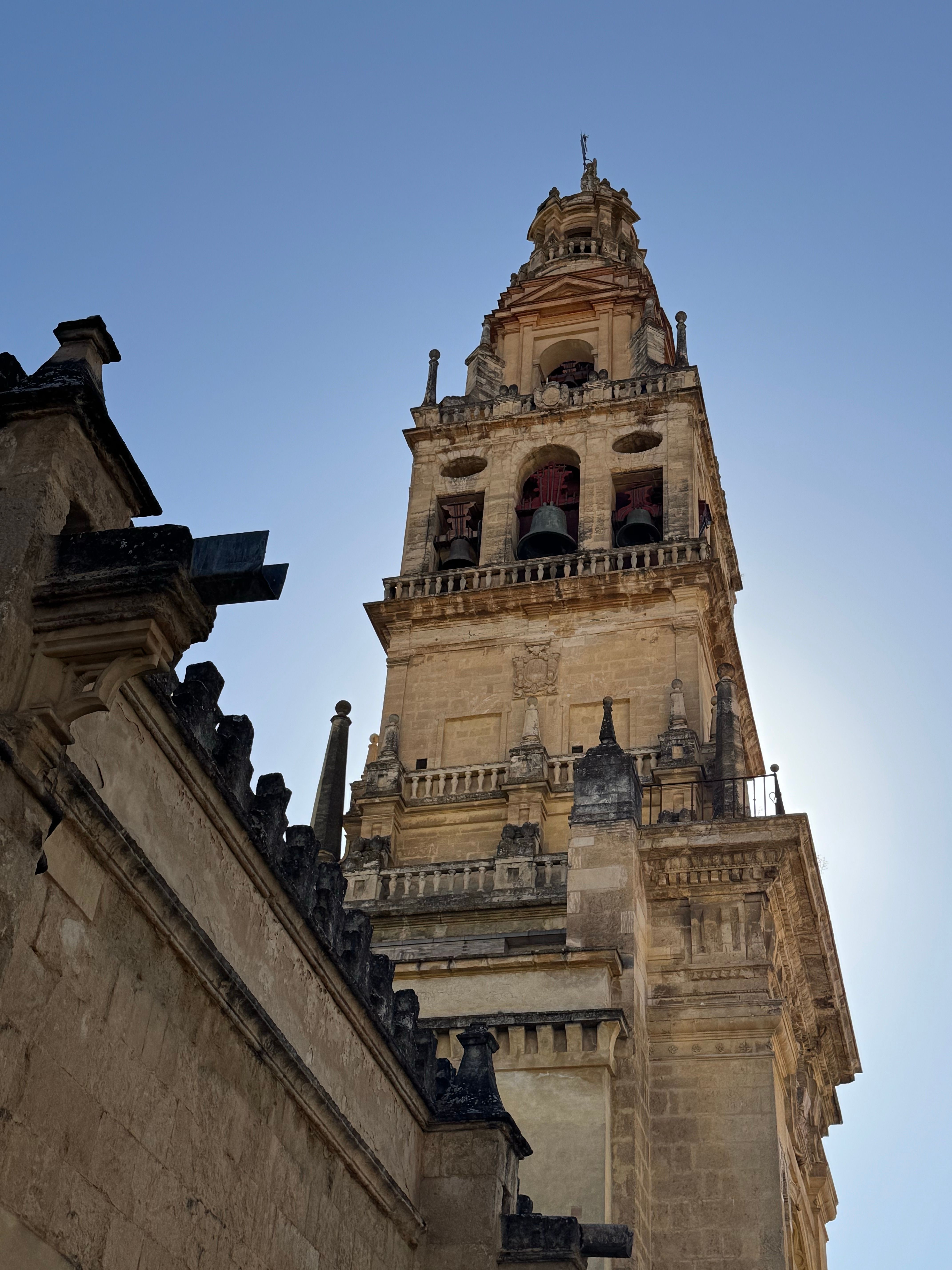 Historic Bell Tower Against Clear Blue Sky · Free Stock Photo