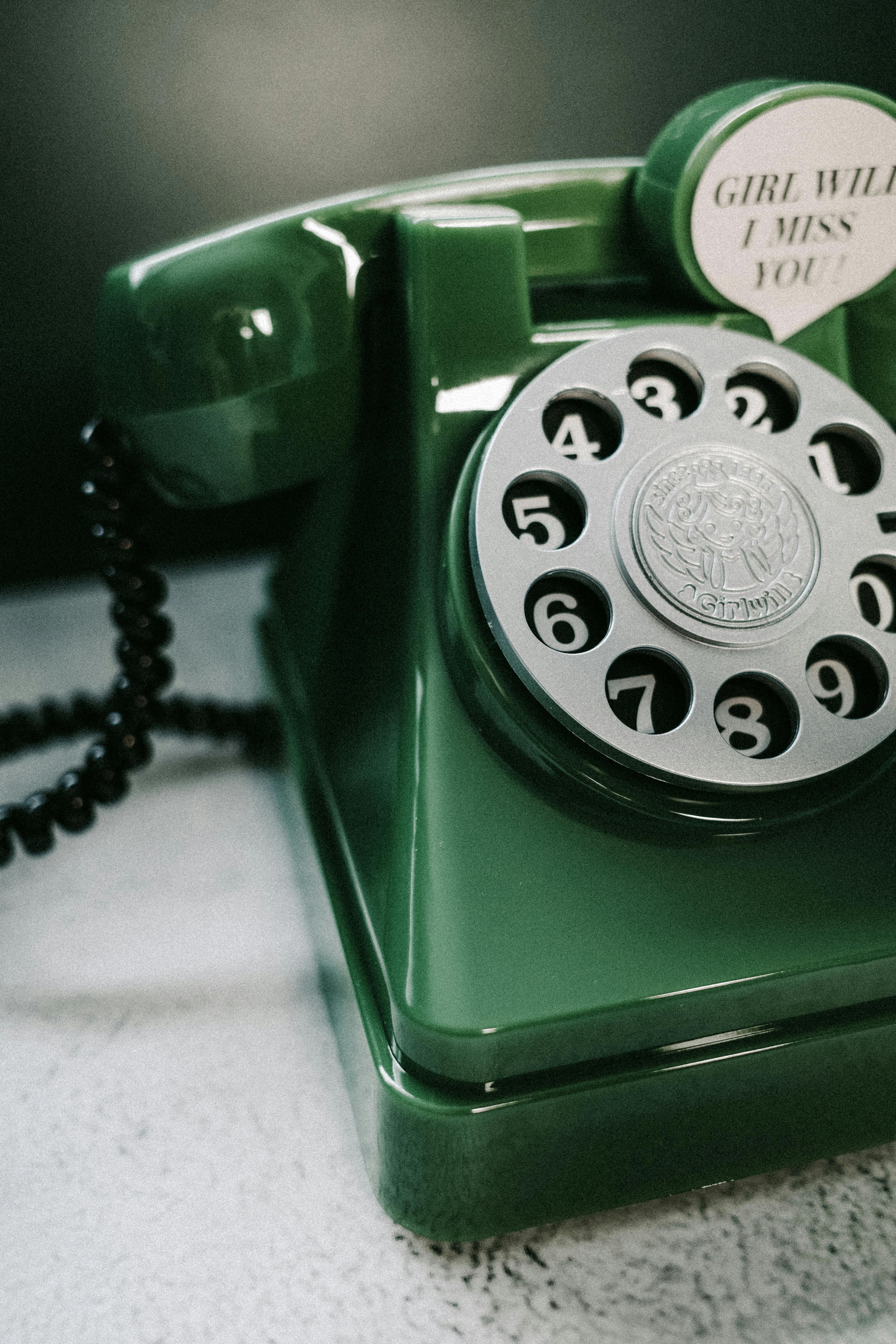 Vintage Green Rotary Telephone with Retro Aesthetic · Free Stock Photo