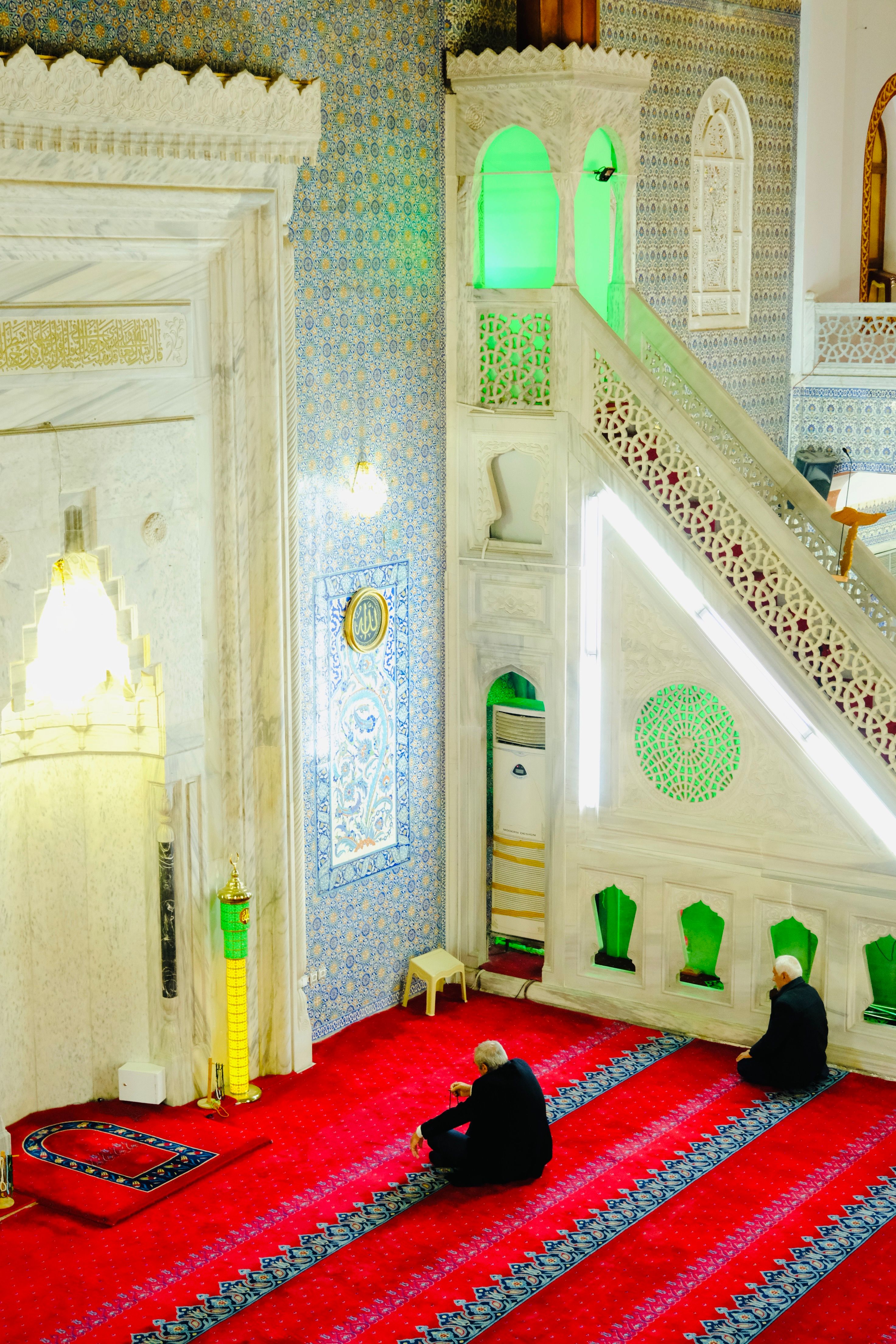 Peaceful Prayer Inside a Beautiful Mosque Interior · Free Stock Photo
