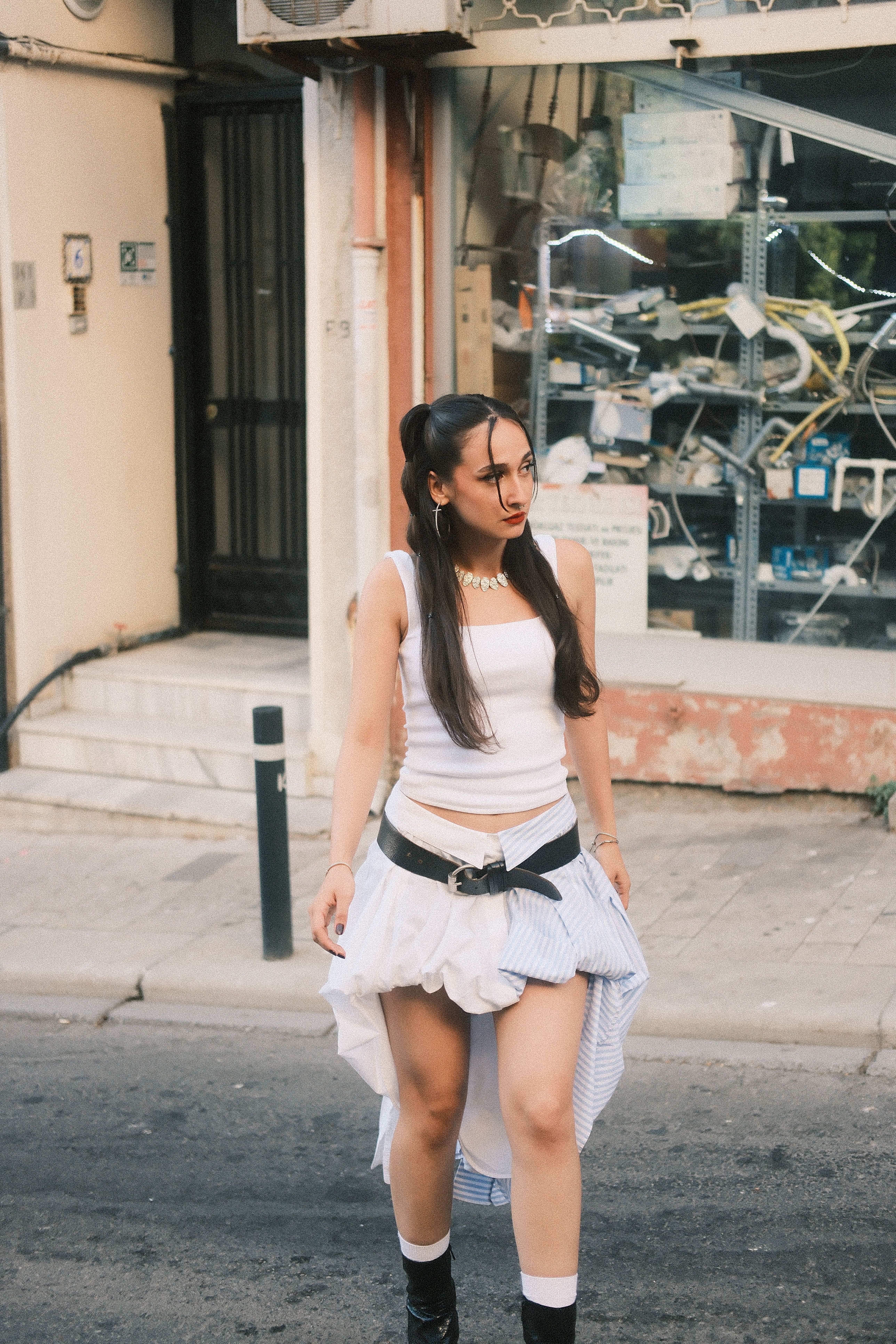 Young Woman Walking in Urban Street Setting · Free Stock Photo