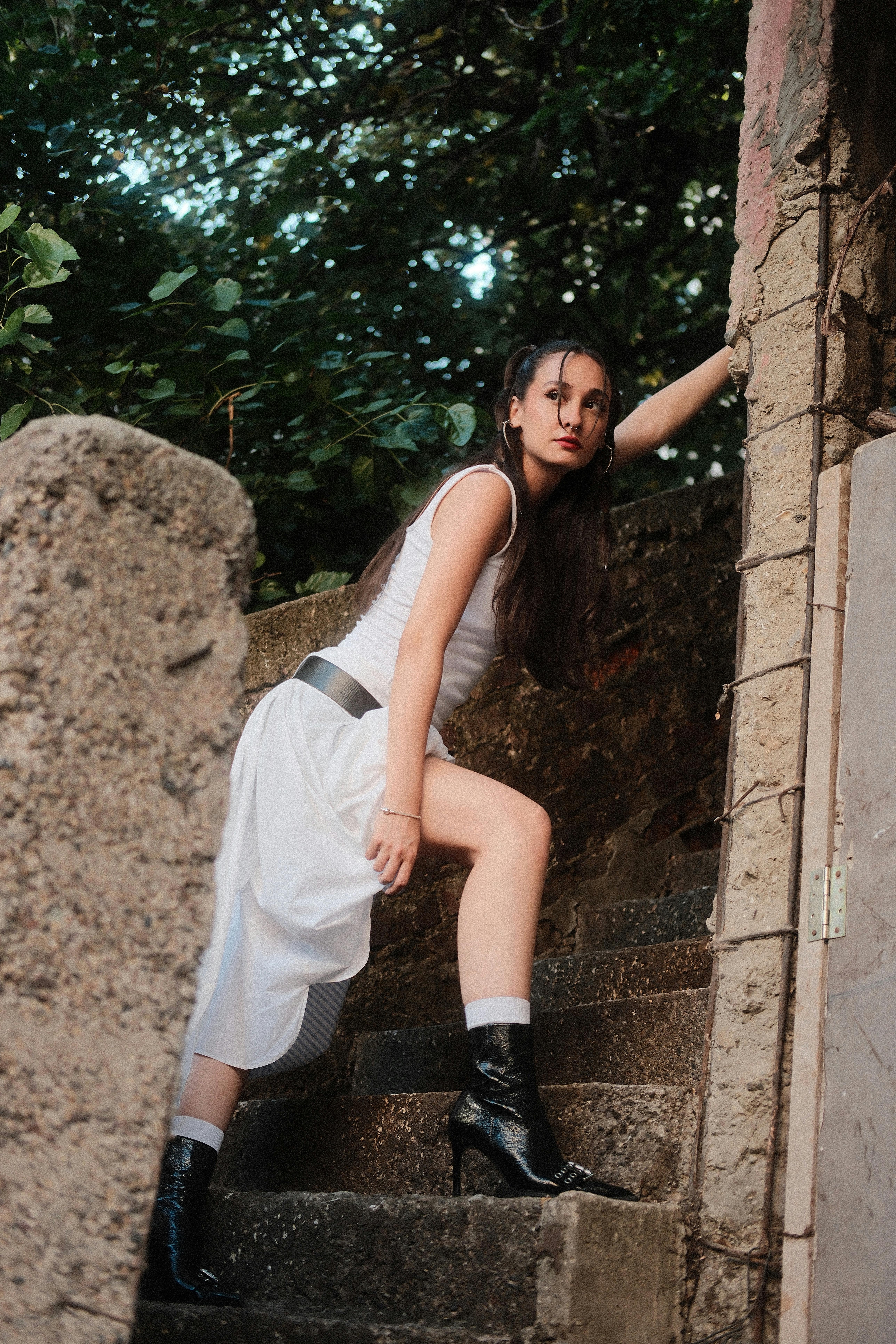 Fashionable Woman Posing on Outdoor Staircase · Free Stock Photo