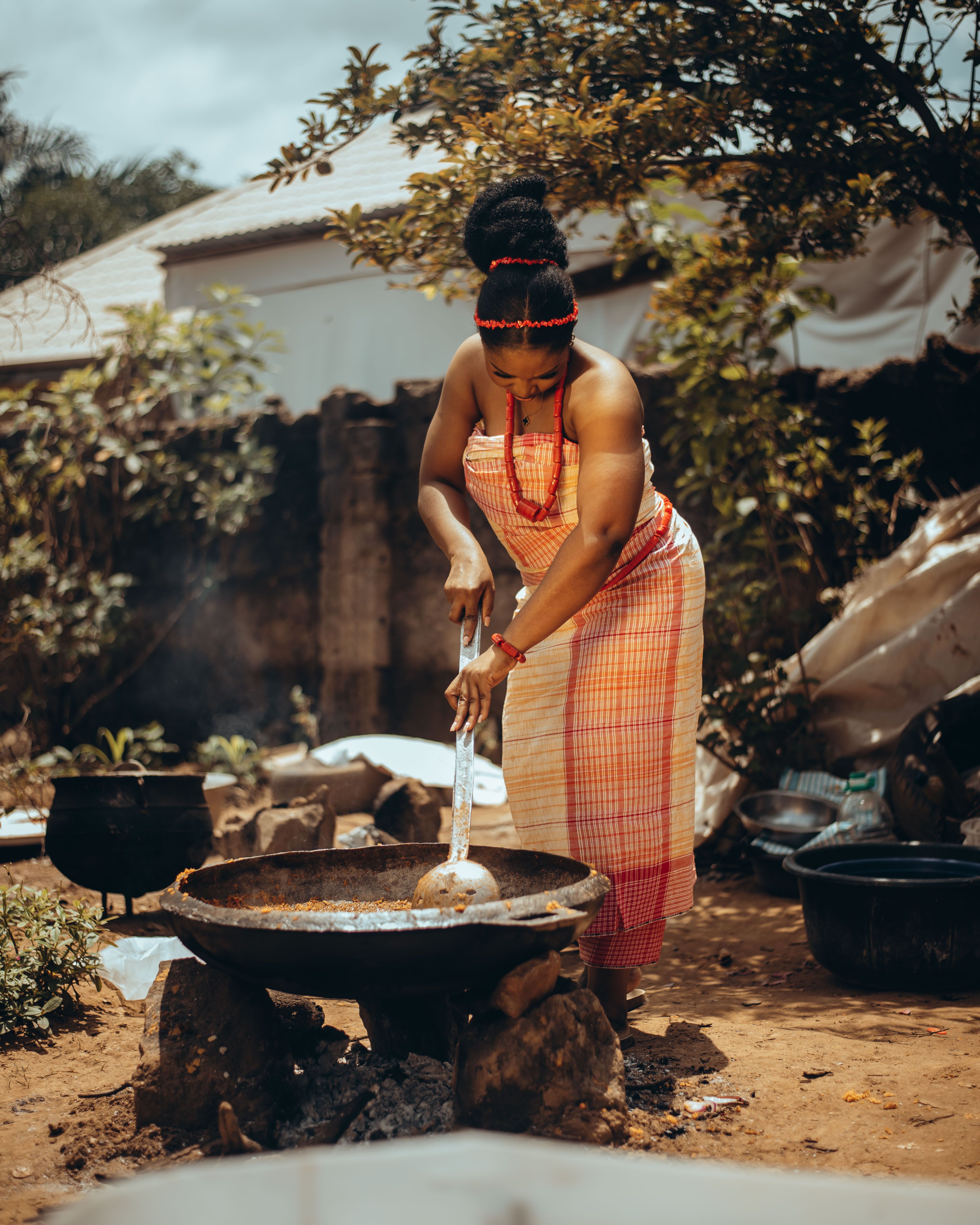 Traditional Nigerian Cooking Outdoors in EN · Free Stock Photo
