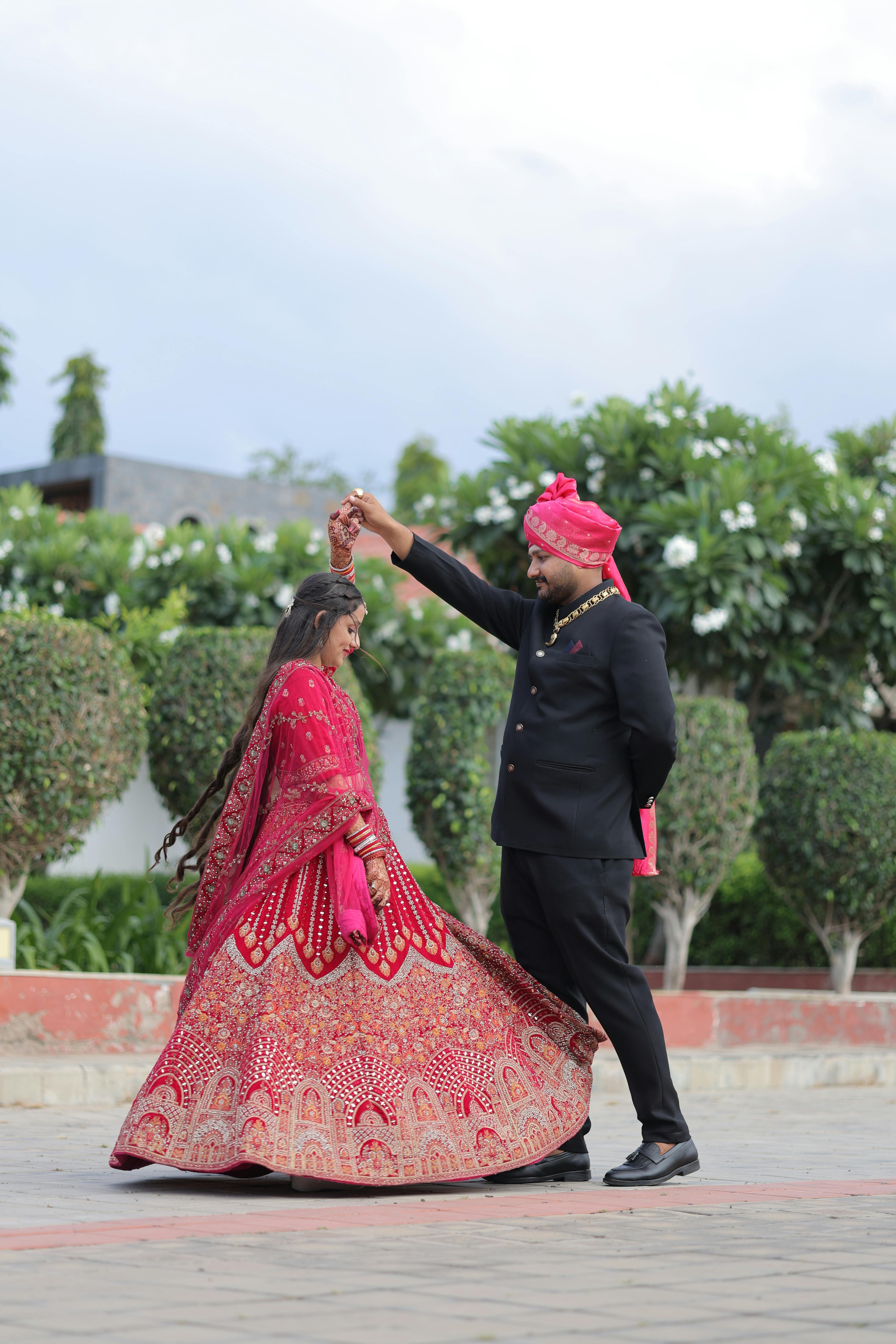 Joyful Indian Wedding Dance Outdoors · Free Stock Photo