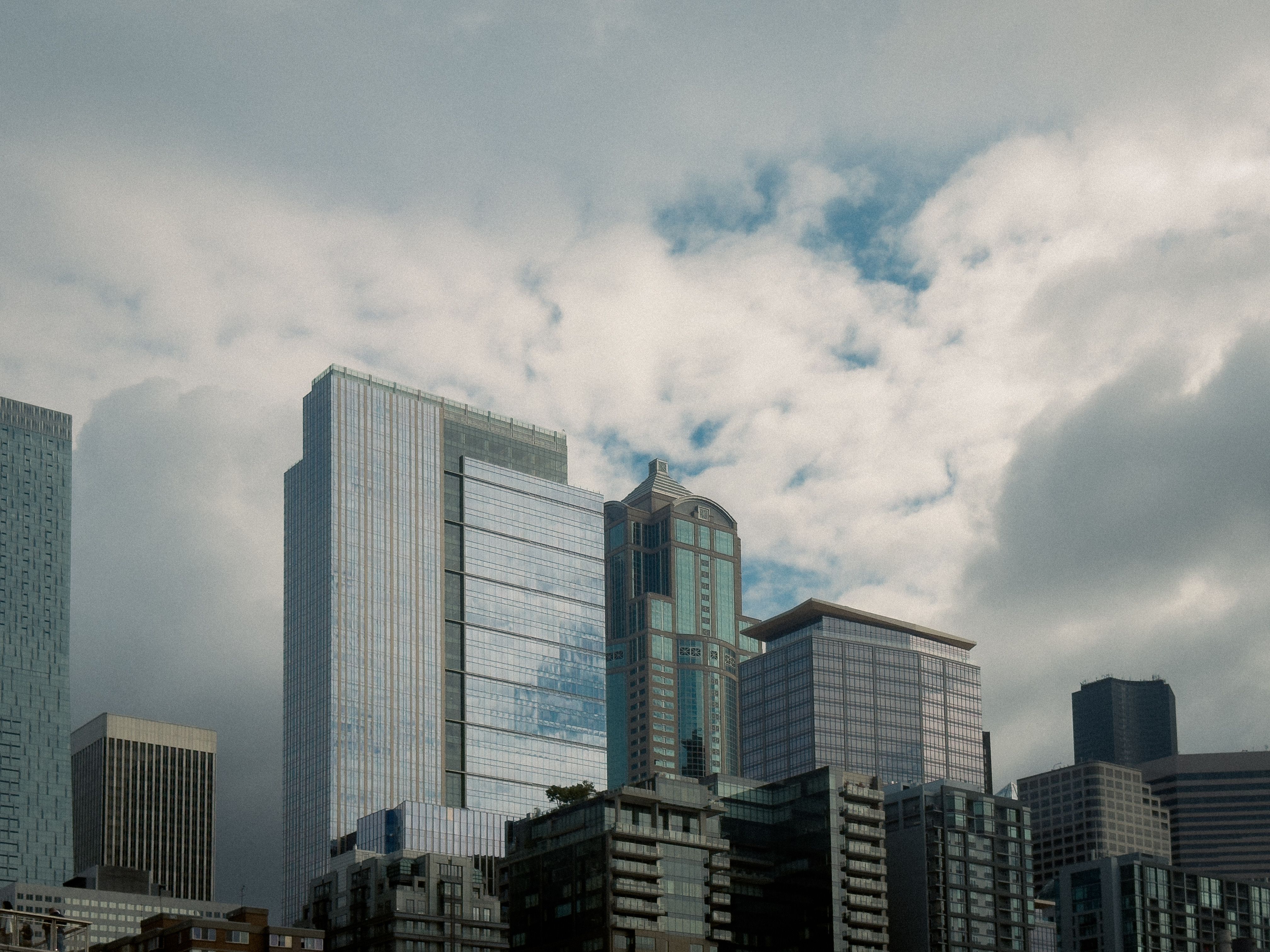 Seattle Skyline with Moody Cloudy Sky · Free Stock Photo