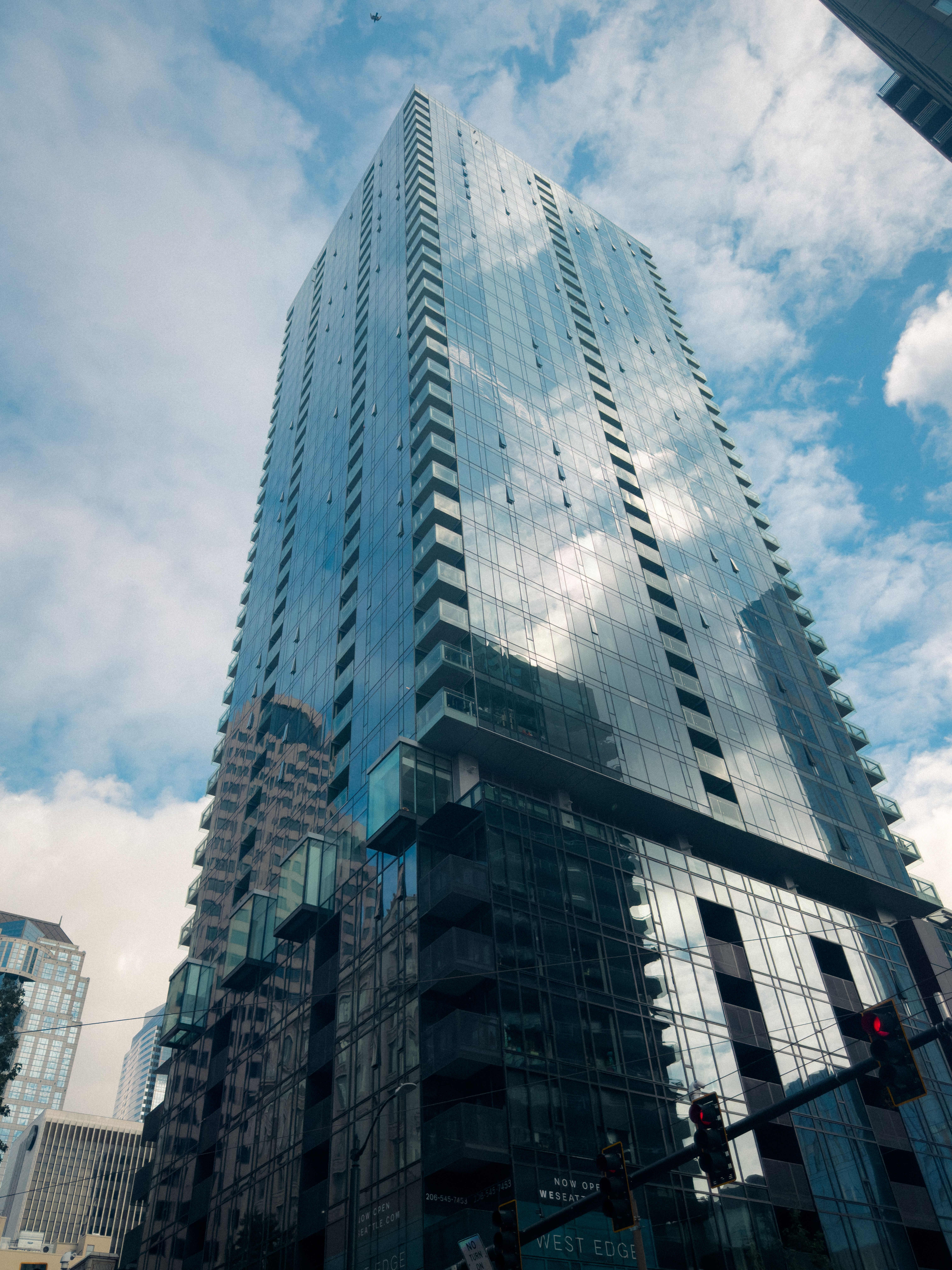 Seattle Skyscraper with Reflections and Blue Sky · Free Stock Photo