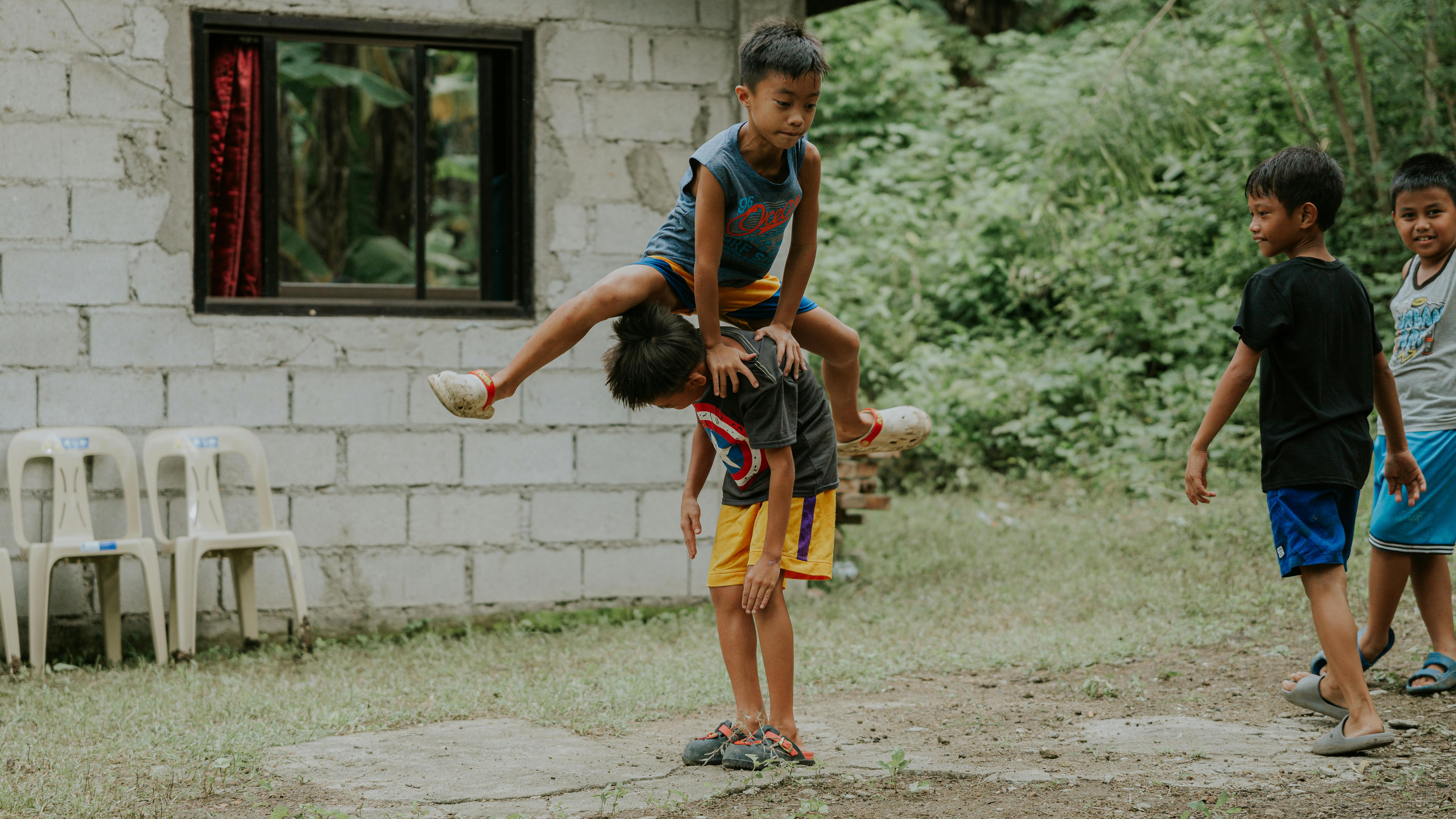 Children Playing Traditional Outdoor Game · Free Stock Photo