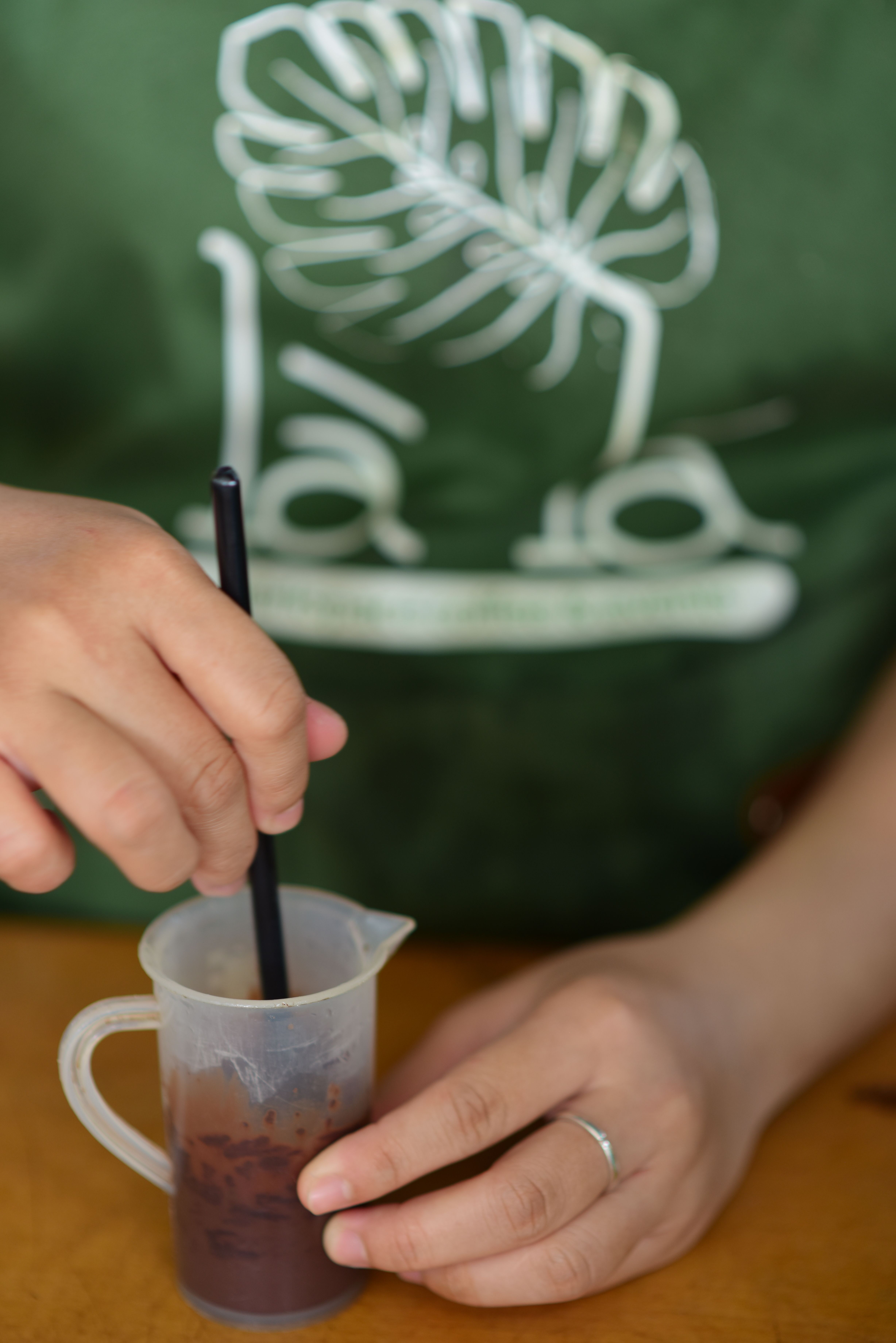 Close-up of Stirring Chocolate Drink in Small Pitcher · Free Stock Photo