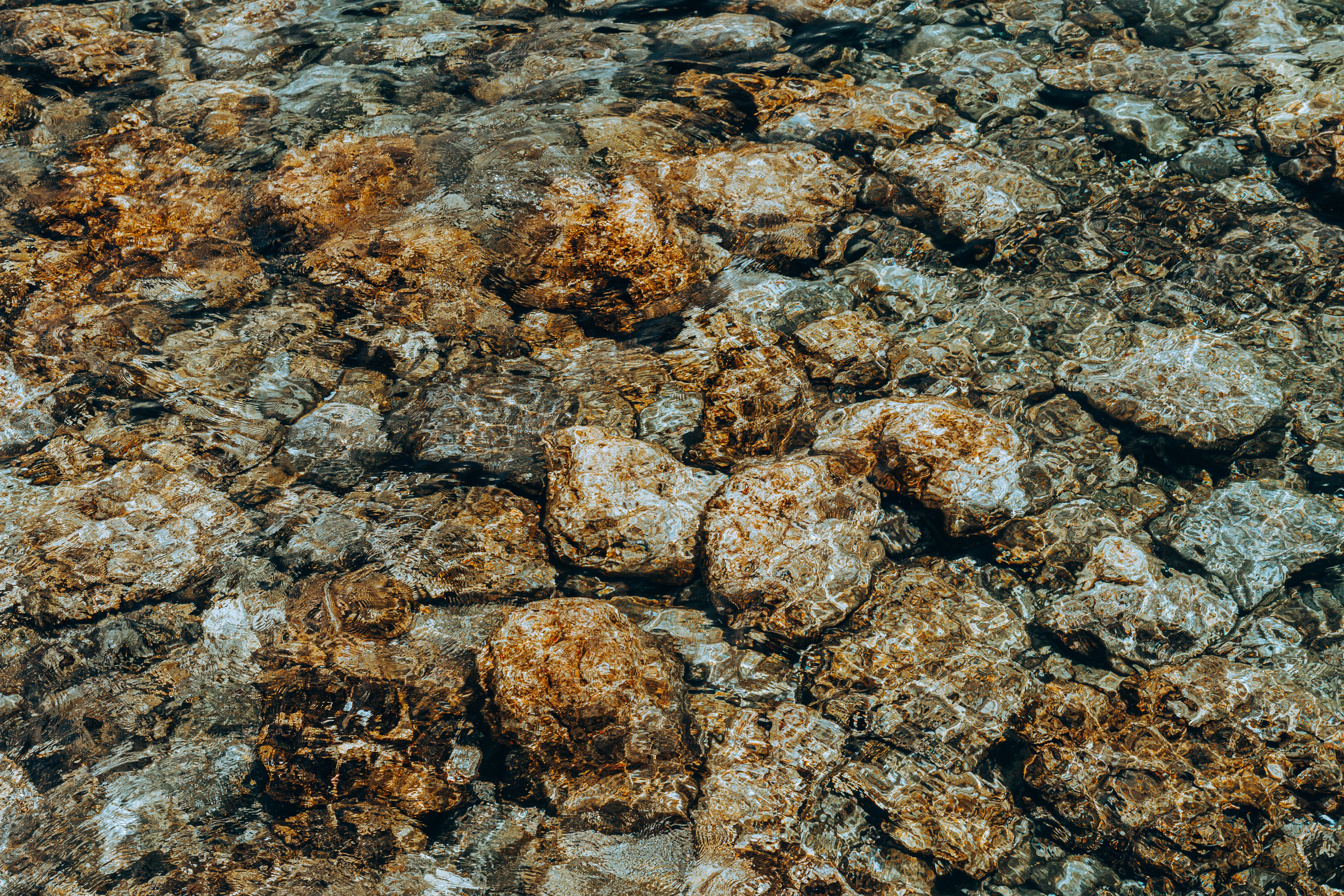 Clear Water Over Rock Formation · Free Stock Photo