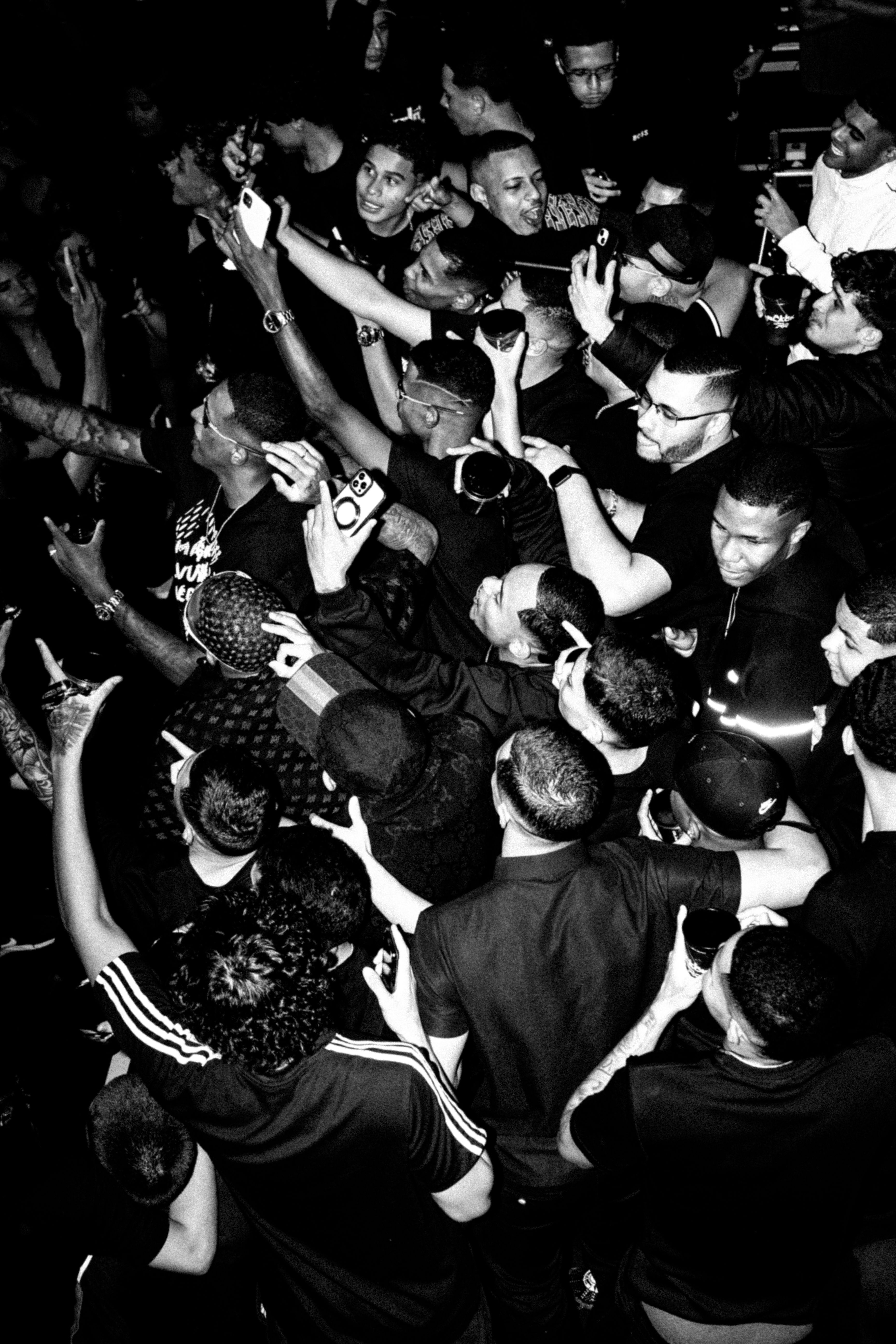 Energetic Black and White Hip-Hop Concert Crowd · Free Stock Photo