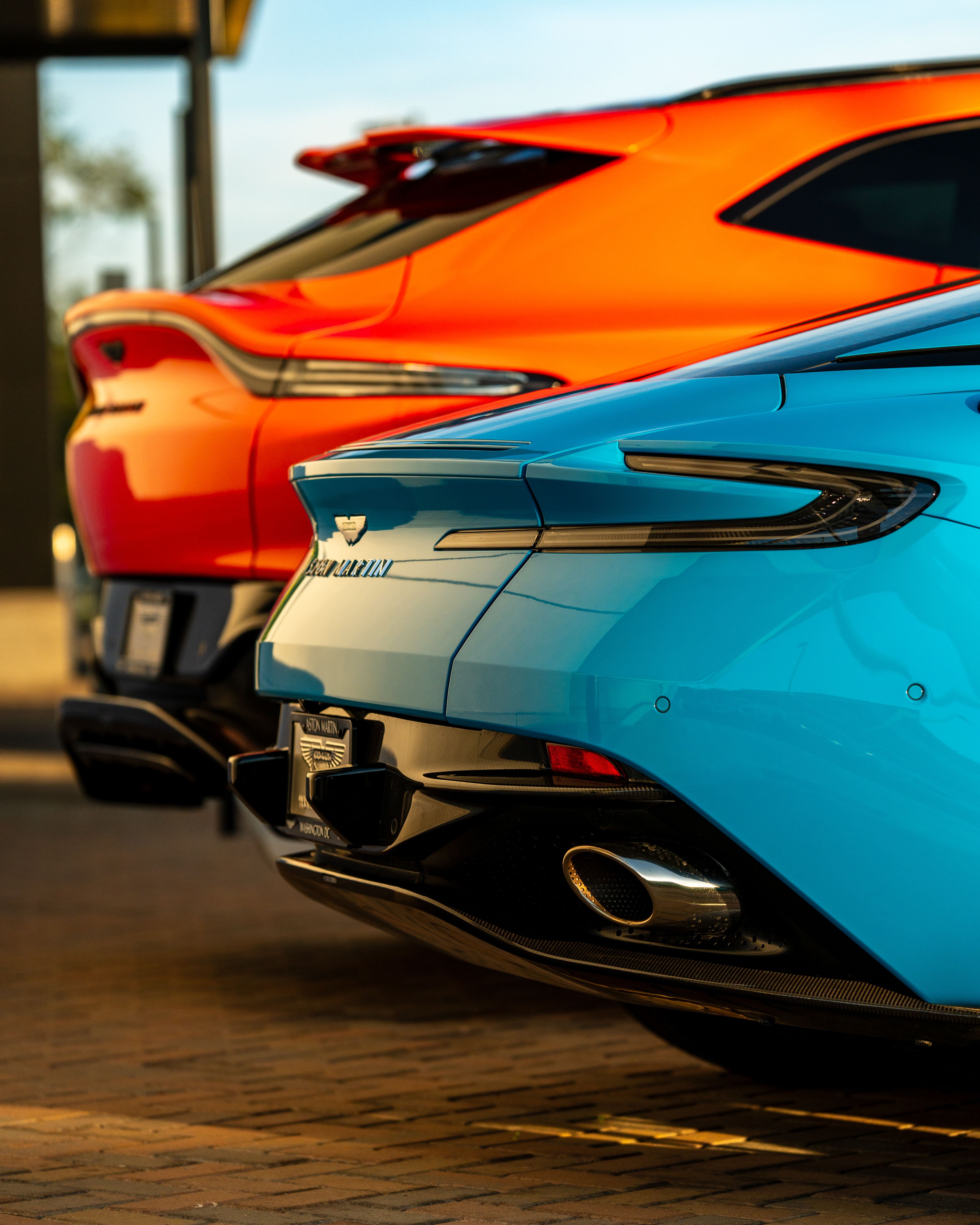 Luxury Sports Cars in Vibrant Contrast · Free Stock Photo