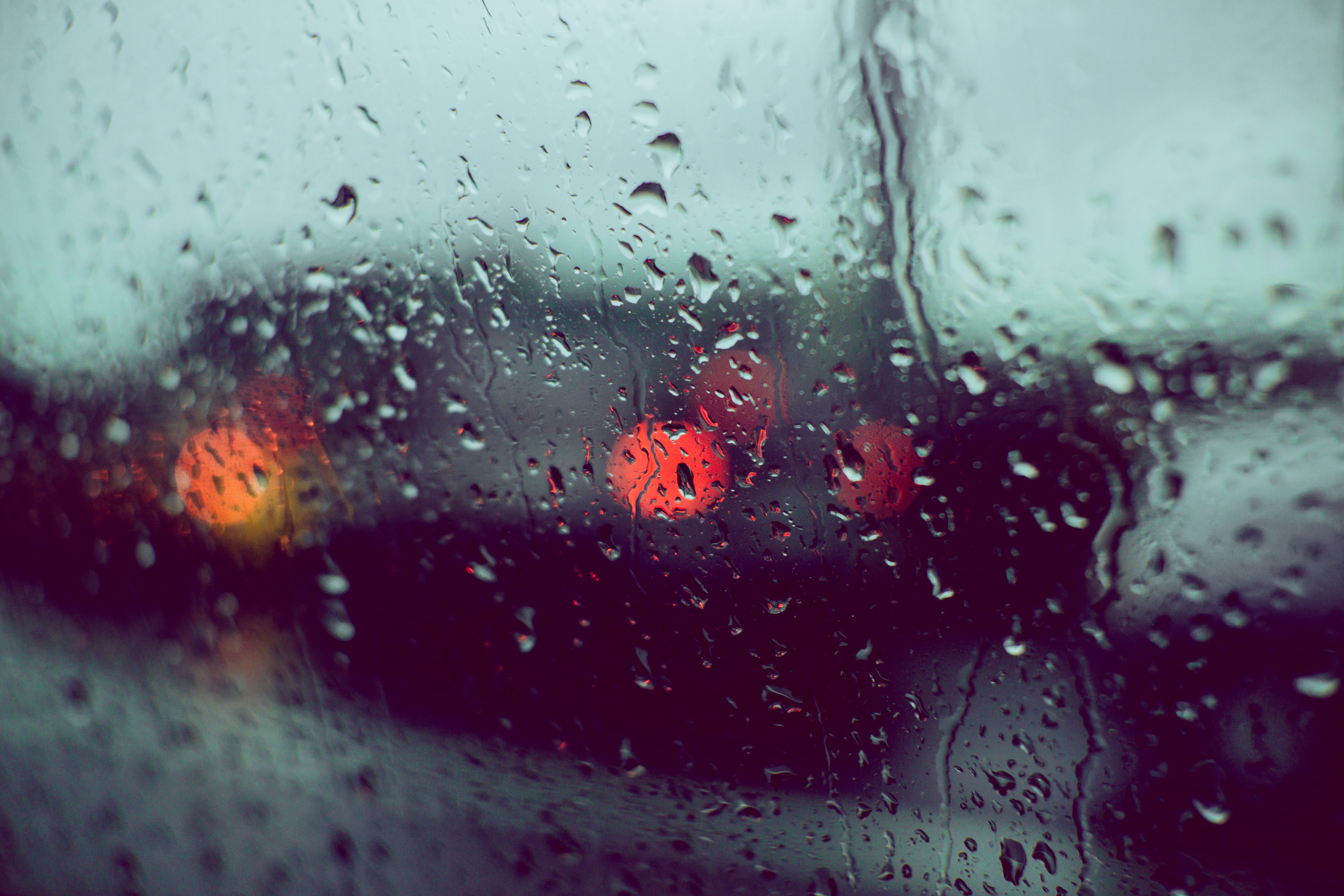 Raindrops on Window in Traffic at Night · Free Stock Photo