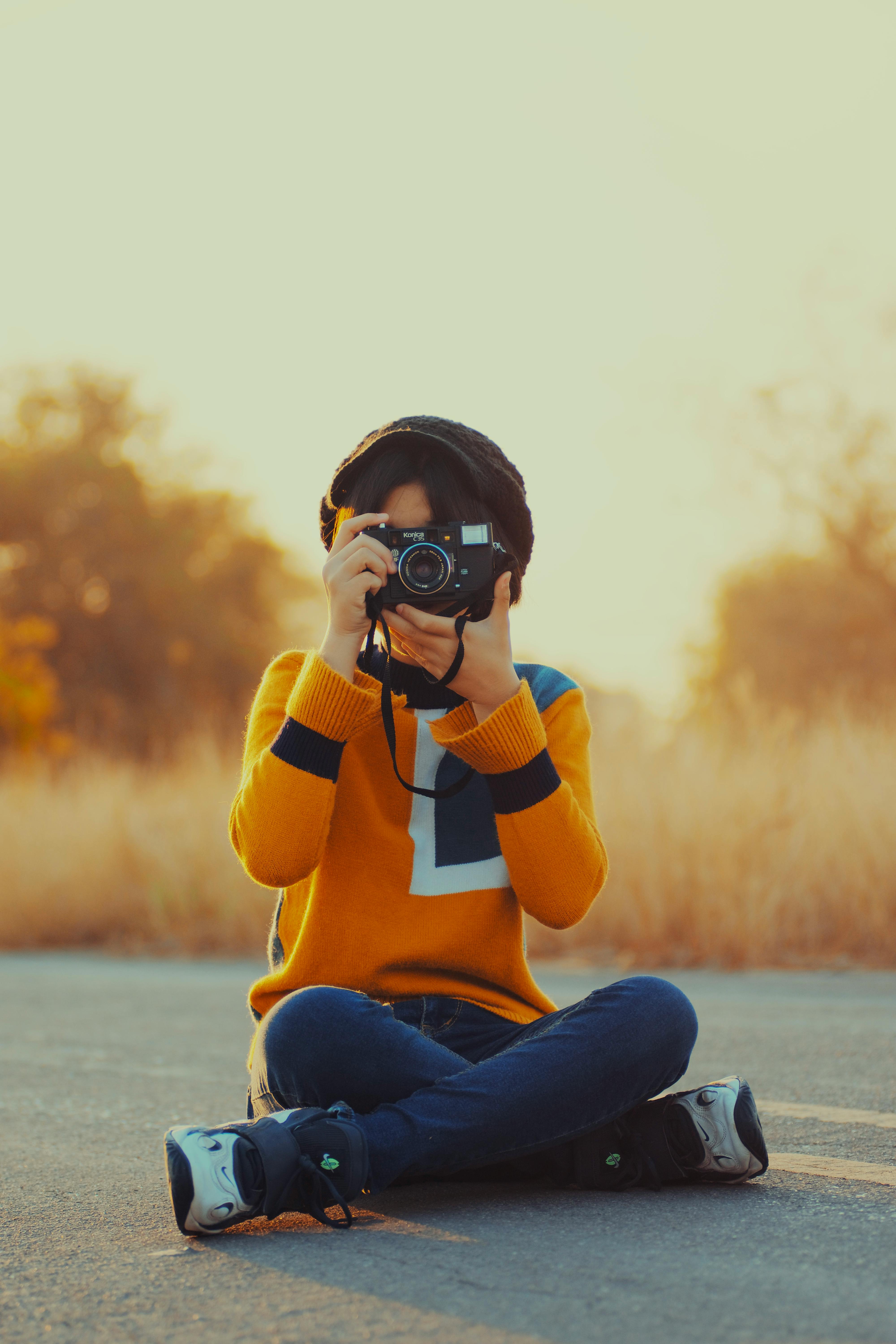 Person Taking Photo Using Camera · Free Stock Photo