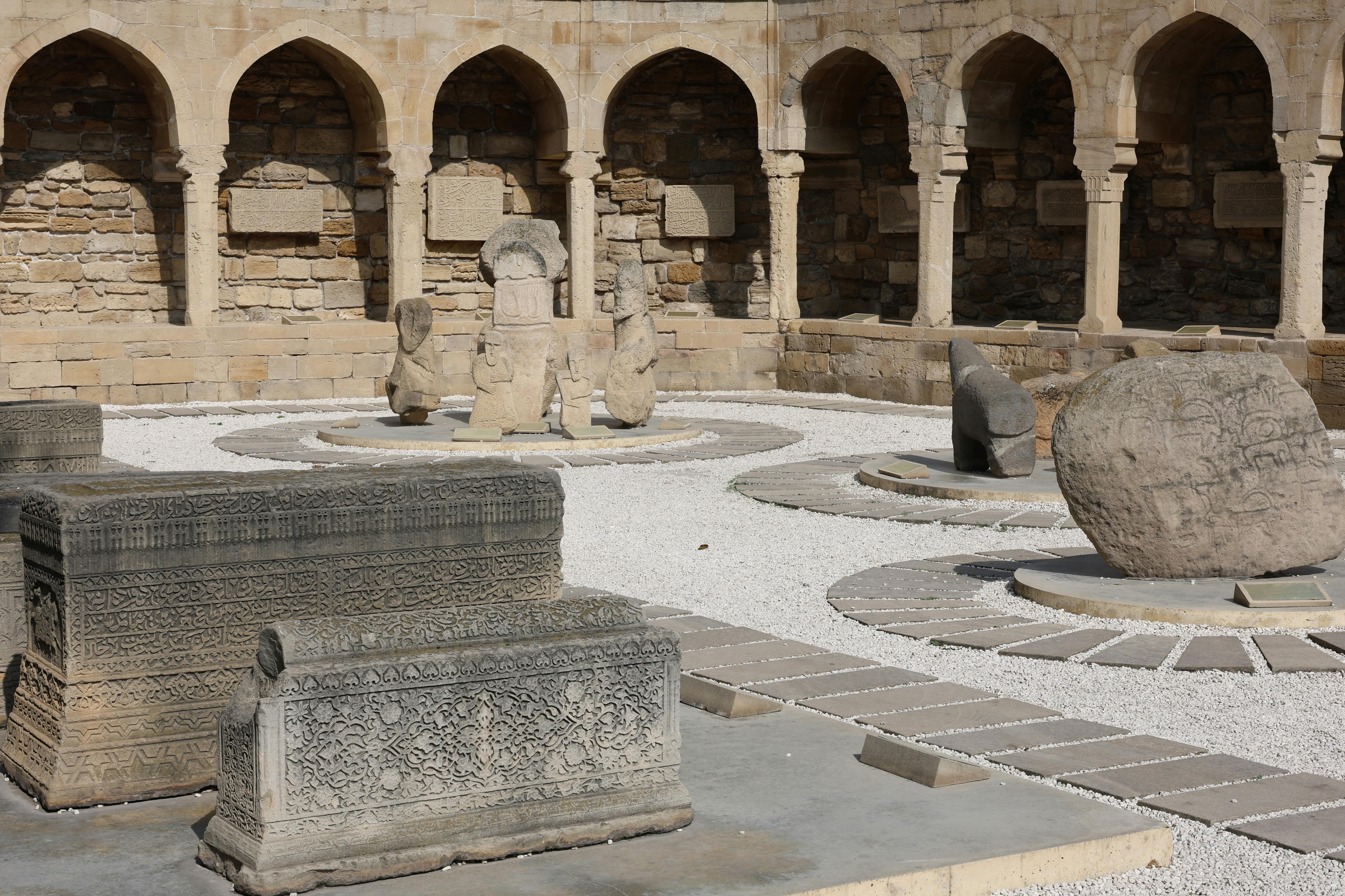 Ancient Stone Monuments in Historic Courtyard · Free Stock Photo