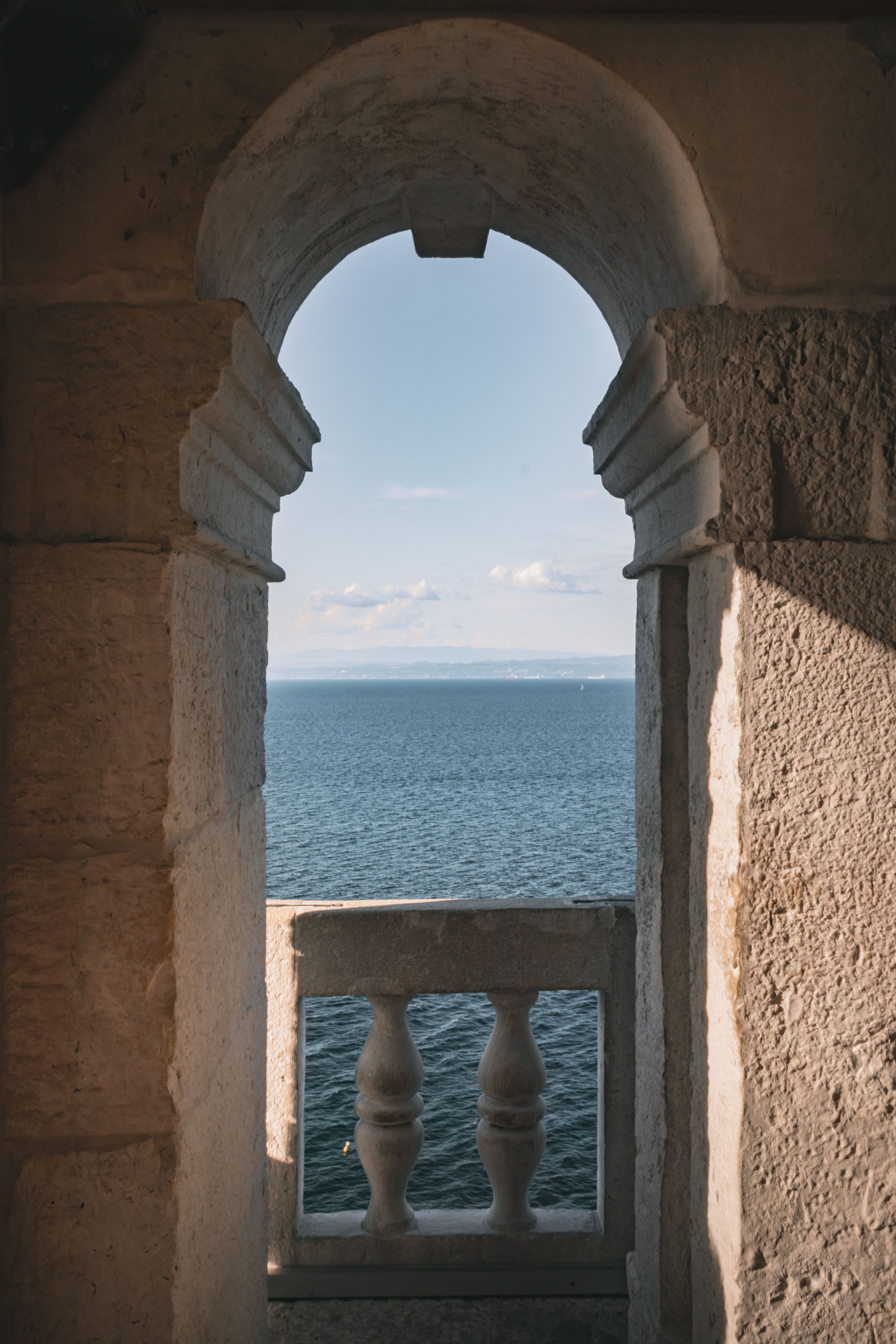 Photo of an Arch Near a Ocean · Free Stock Photo