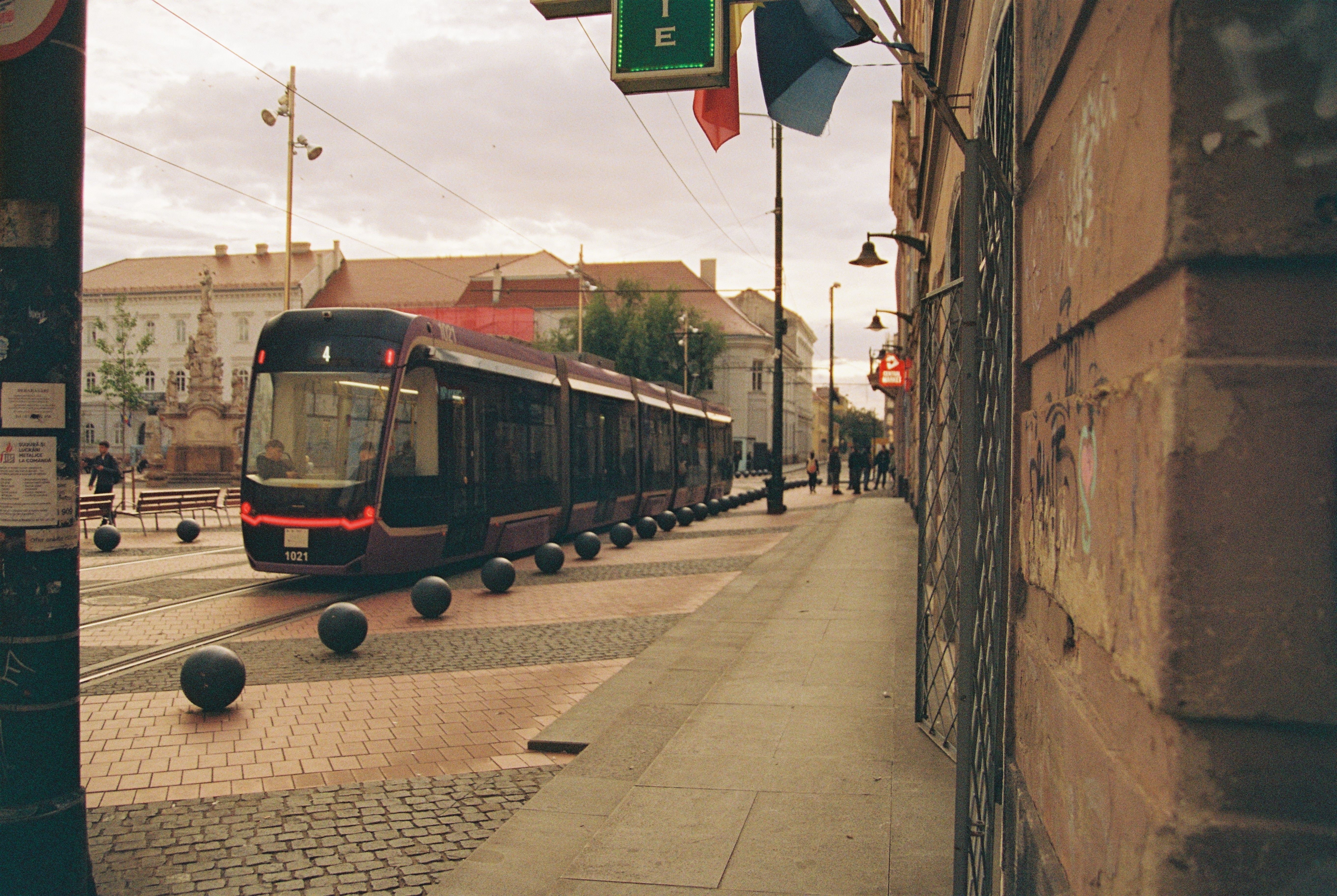 Modern Tram on Urban Street in European City · Free Stock Photo