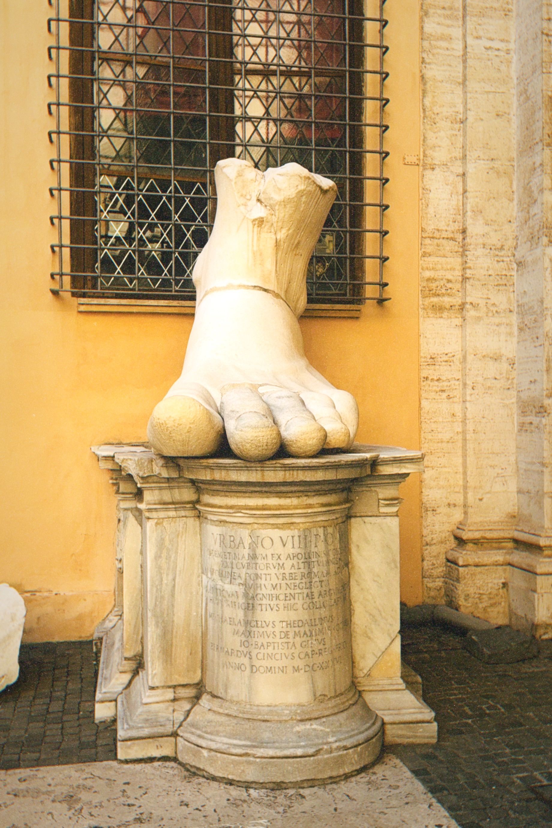 Ancient Roman Foot Sculpture Displayed Outdoors · Free Stock Photo