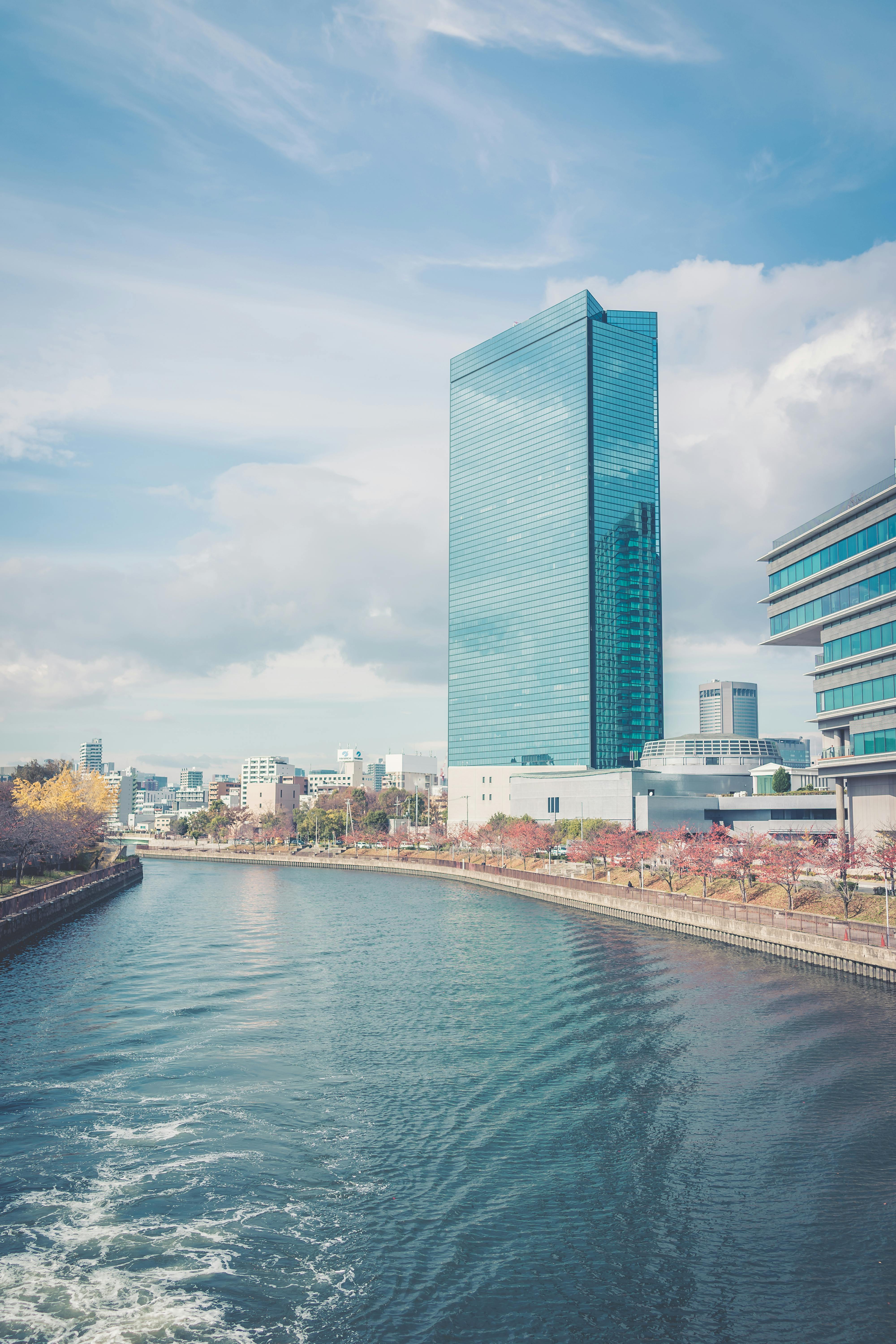 Modern Building Near The River · Free Stock Photo
