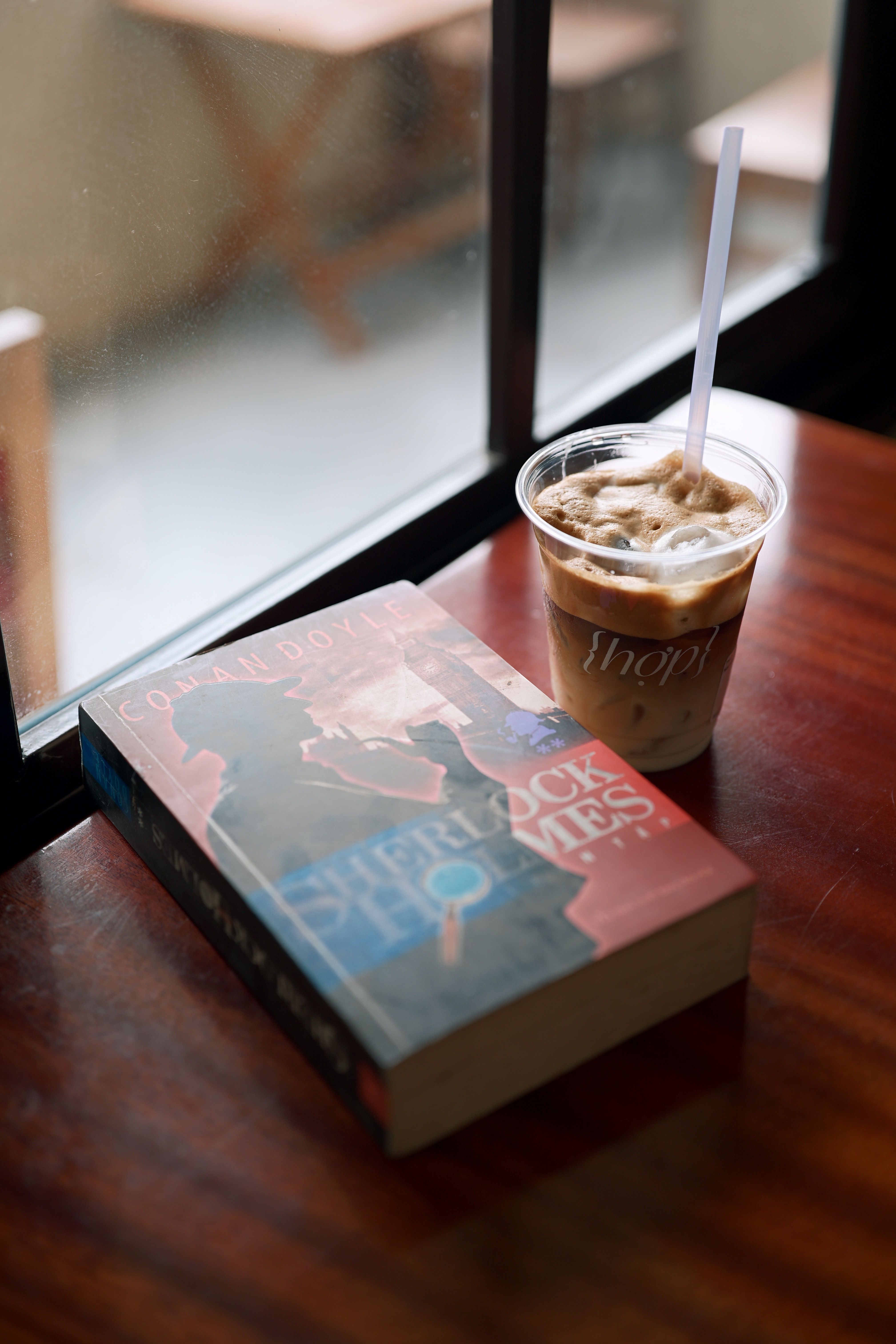 Sherlock Holmes Book and Coffee on Wooden Table · Free Stock Photo