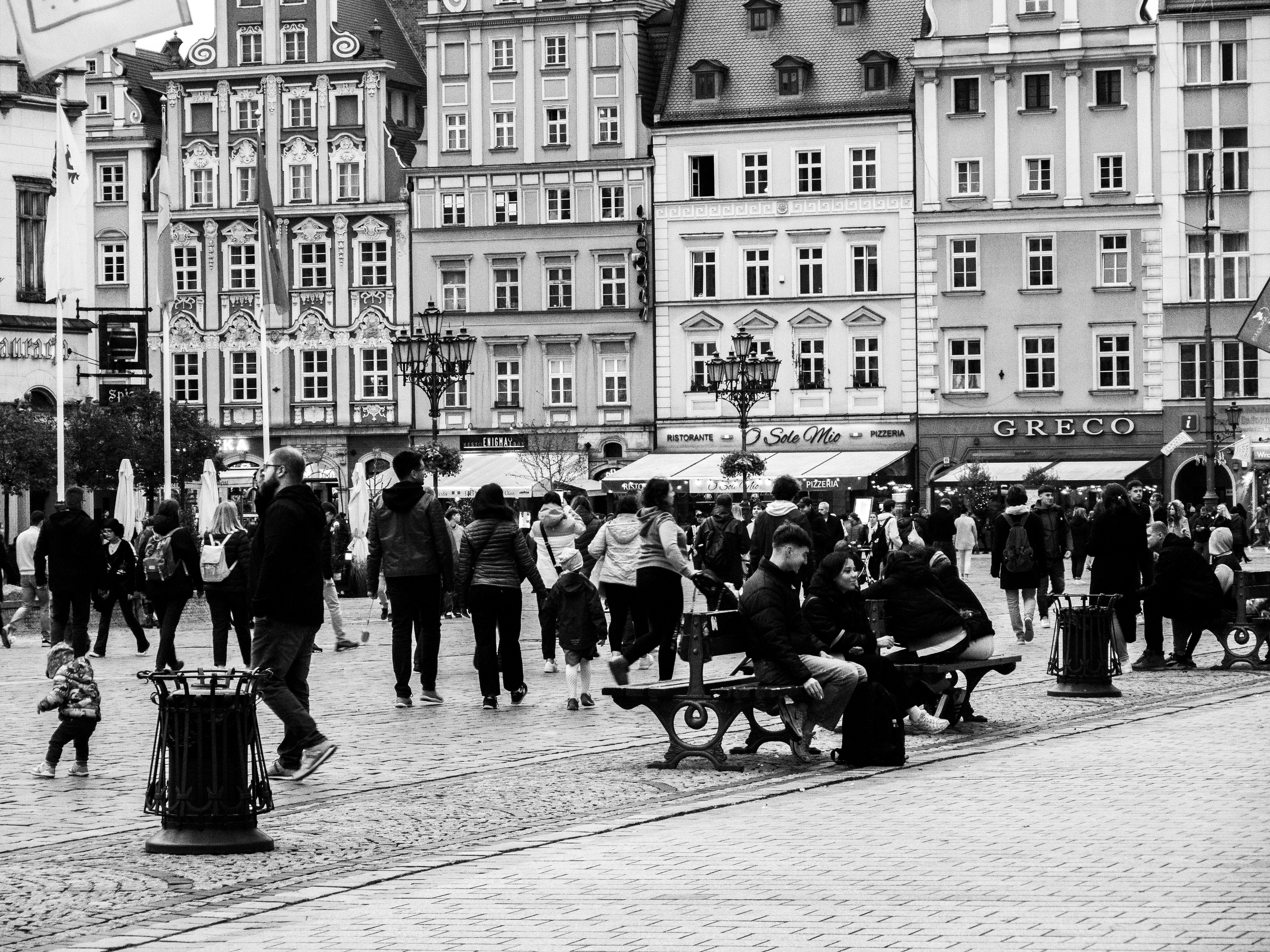 Lively European Square with Crowd in Black and White · Free Stock Photo