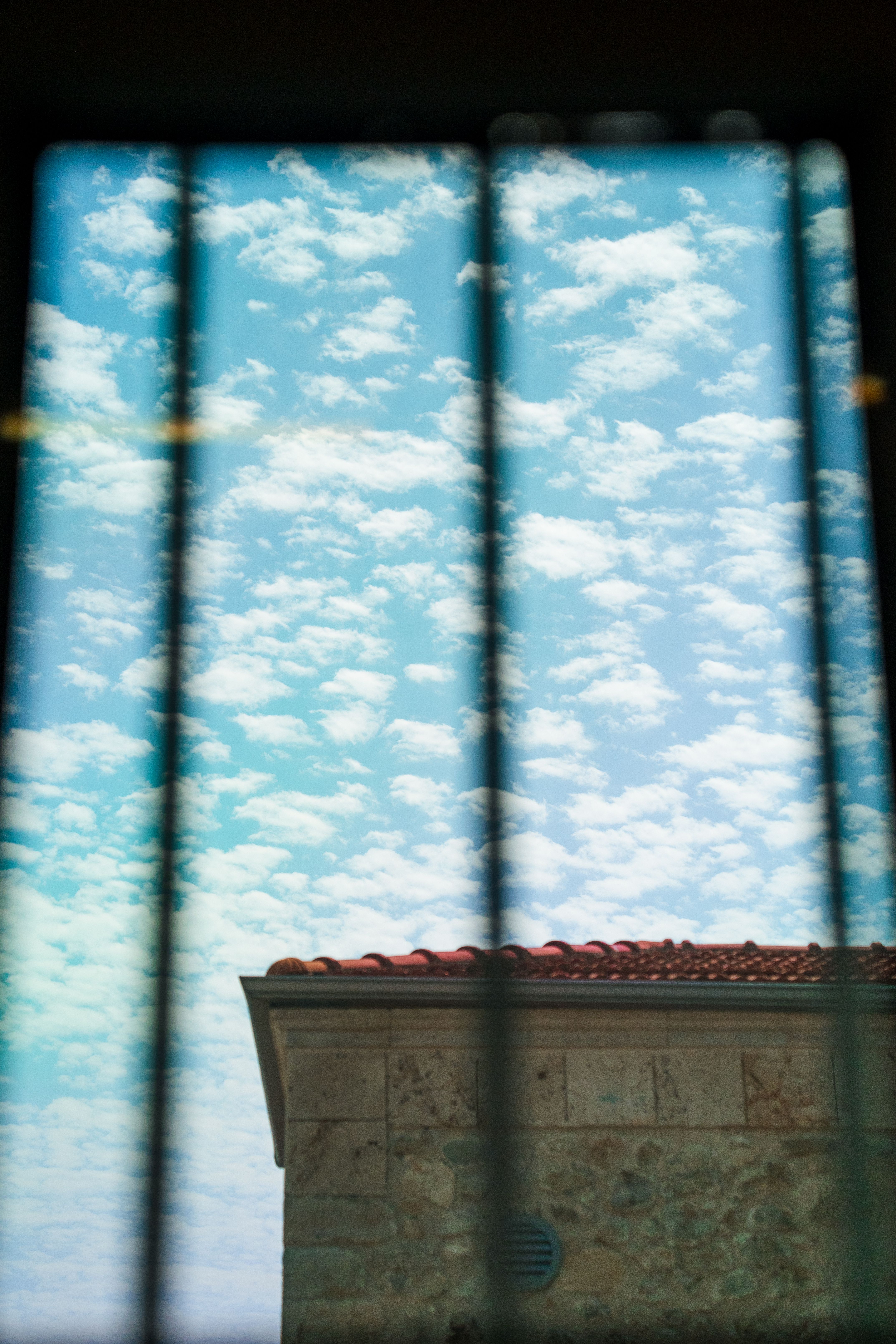 Captivating Sky View Through Window Bars · Free Stock Photo