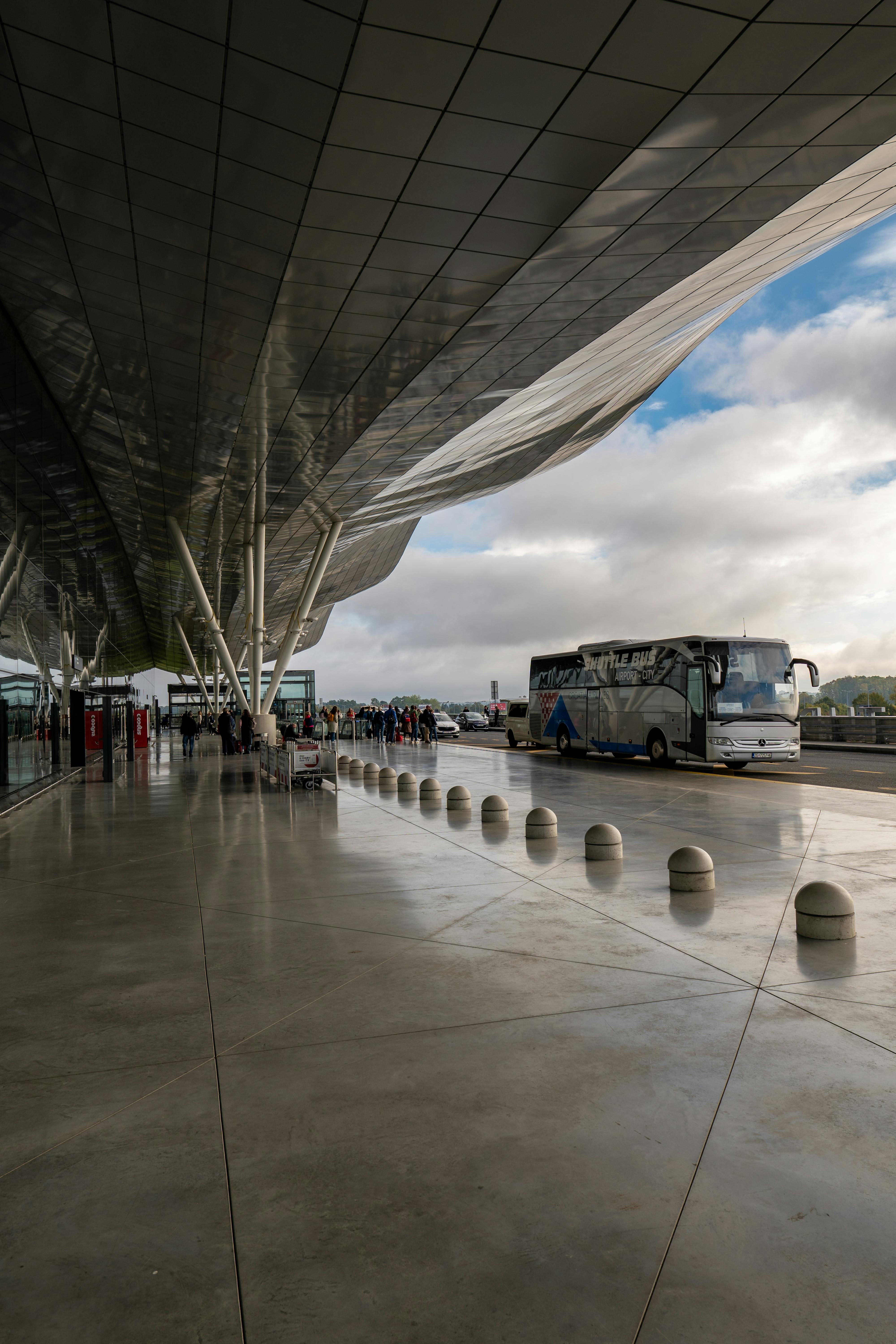 Modern Zagreb Airport Bus Terminal Scene · Free Stock Photo