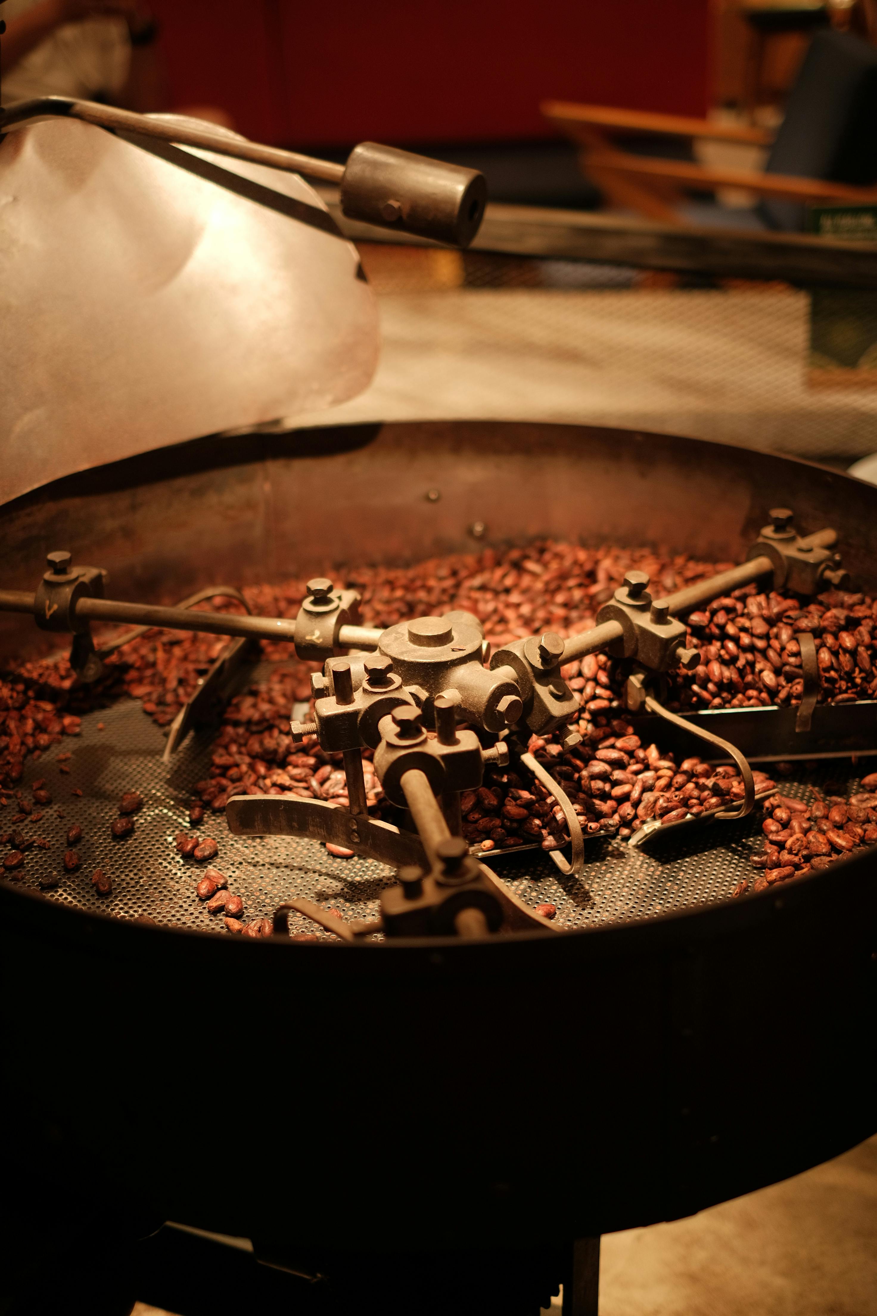 Industrial Coffee Roaster with Roasting Beans · Free Stock Photo