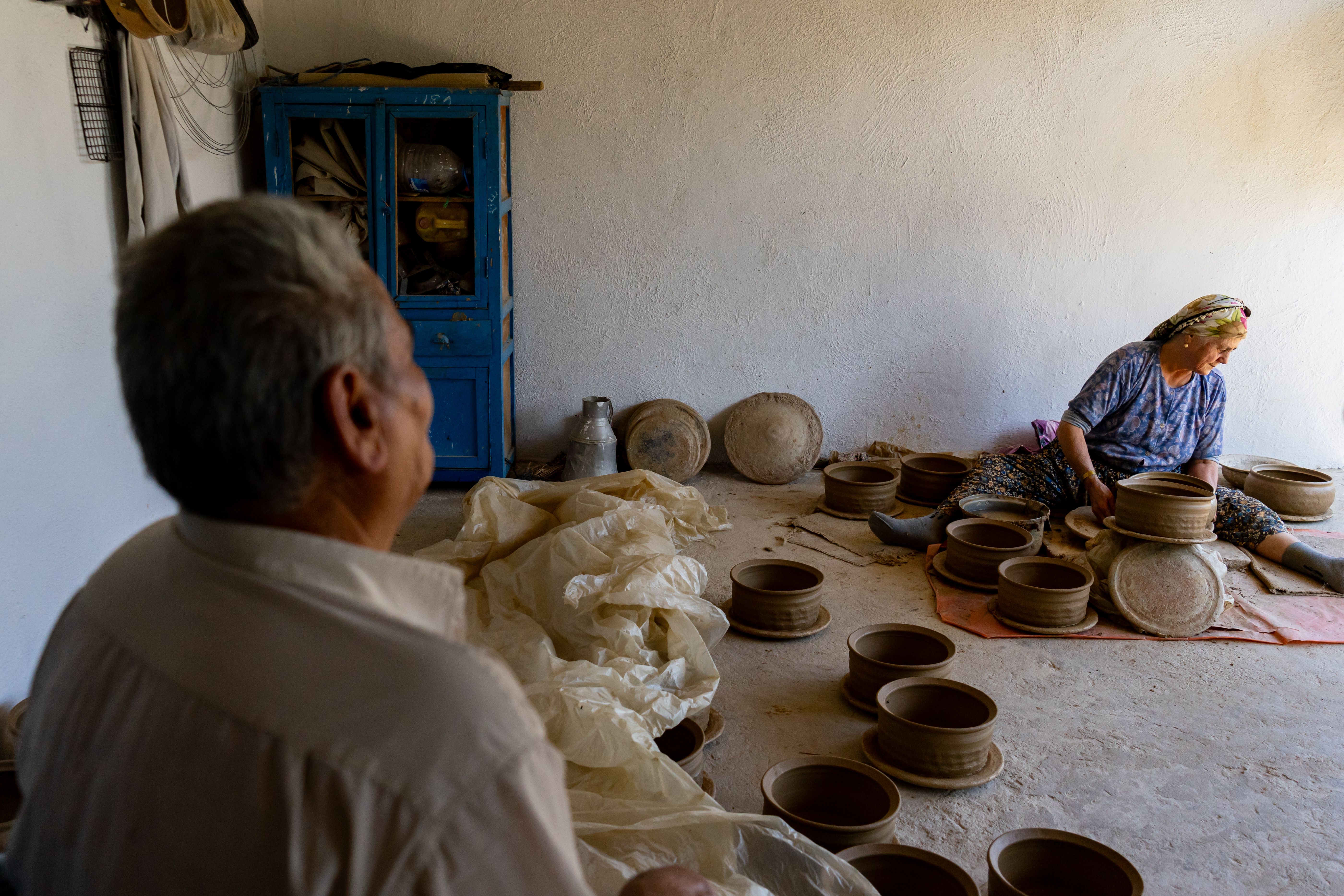 Traditional Pottery Workshop with Artisans · Free Stock Photo