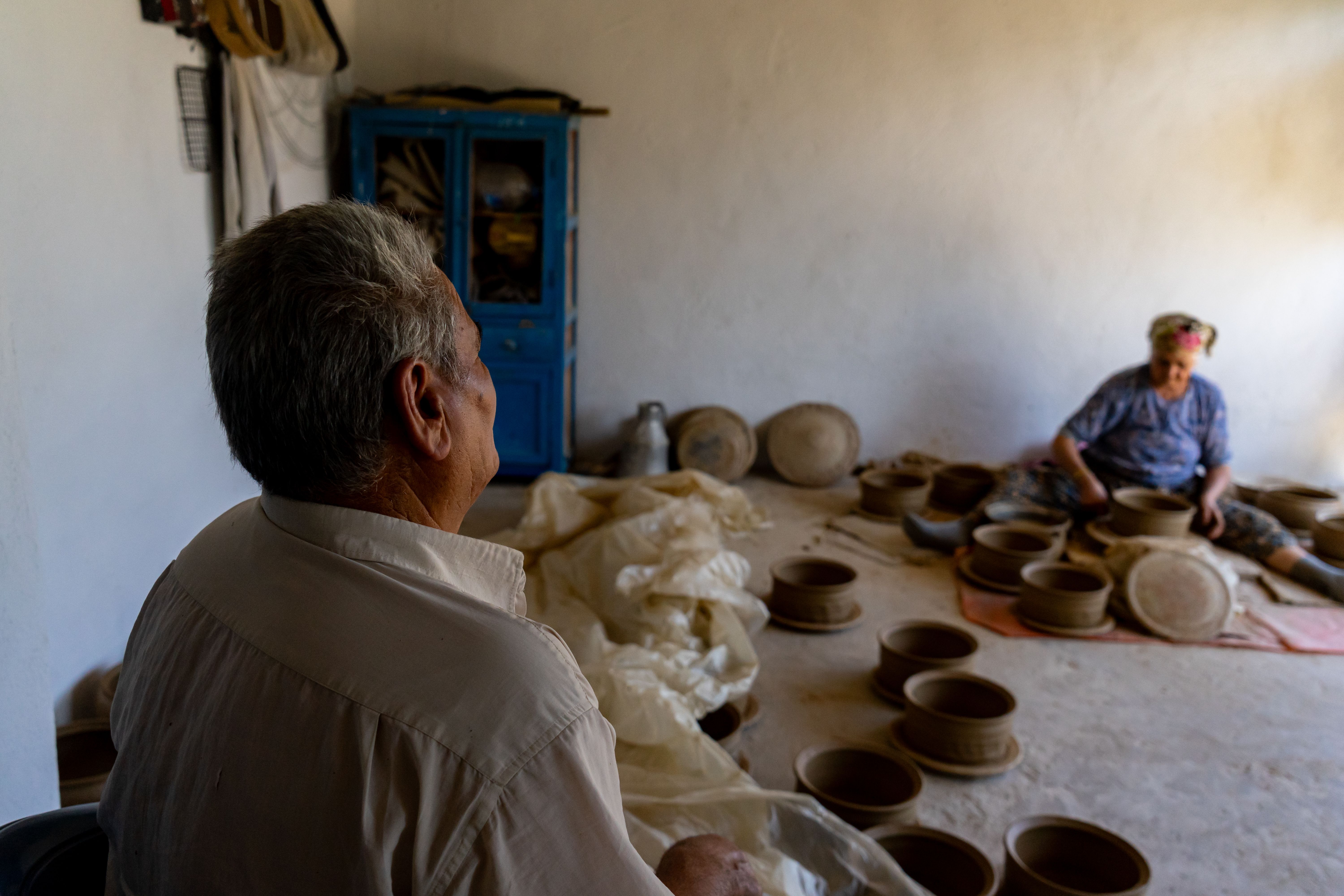 Traditional Pottery Workshop with Artisans · Free Stock Photo