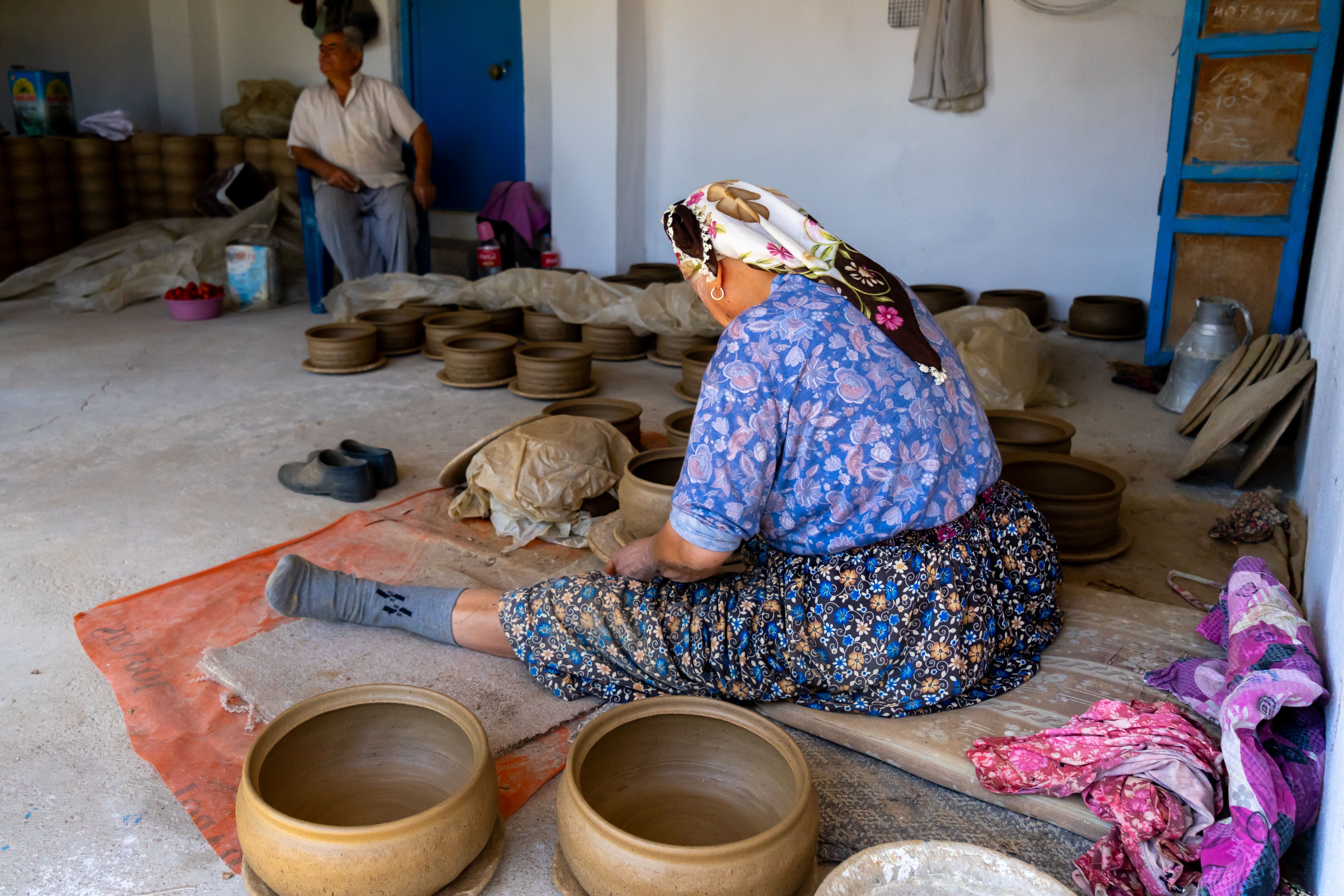 Traditional Pottery Making in Workshop Scene · Free Stock Photo