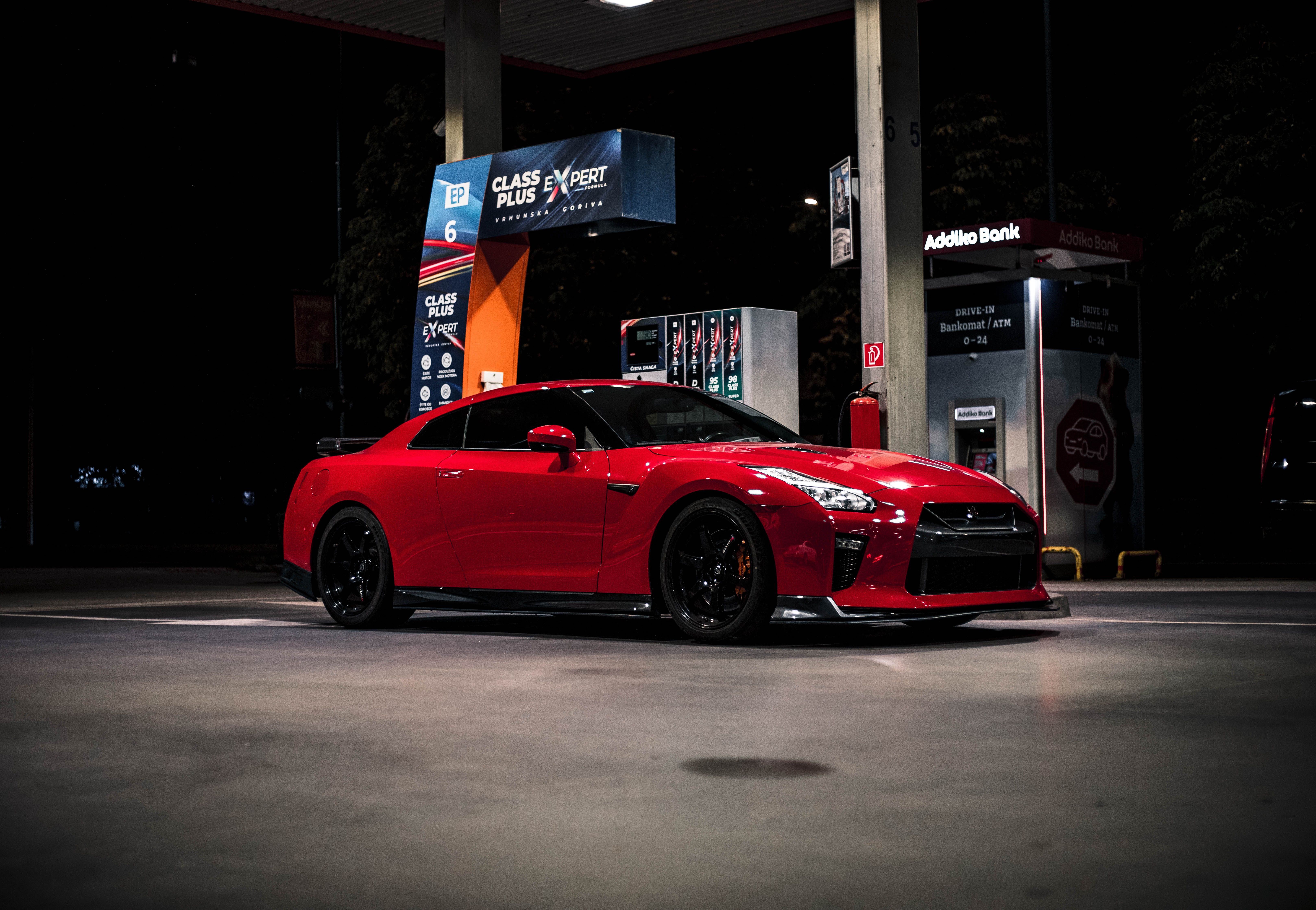 Red Nissan GTR at Sarajevo Gas Station at Night · Free Stock Photo
