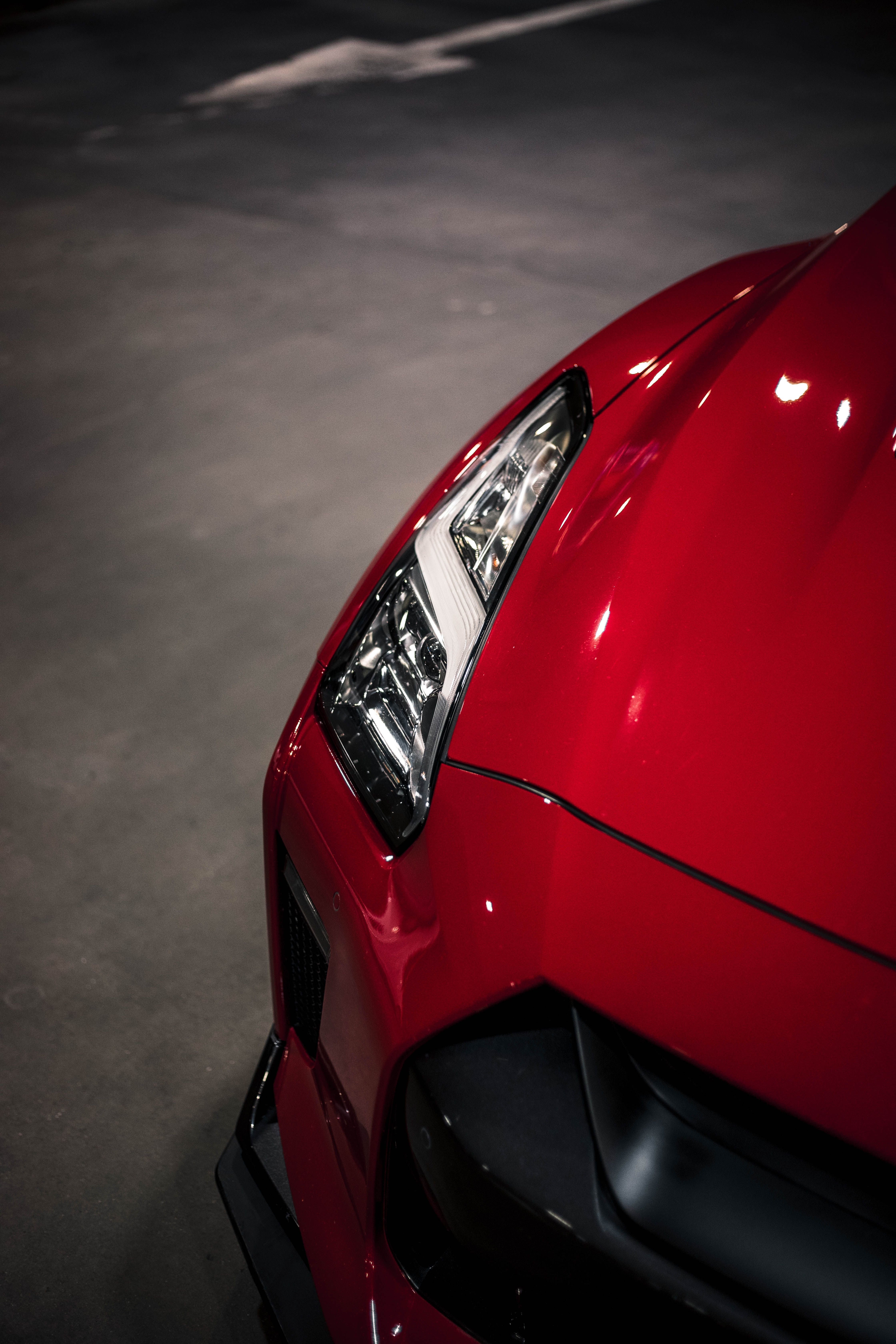 Red Nissan GTR at Urban Night Scene · Free Stock Photo